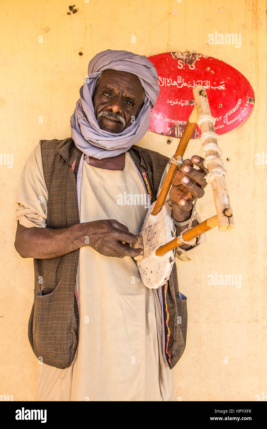 Khartoum, Sudan - Dec 19, 2015: Sudanese man playing a local music ...
