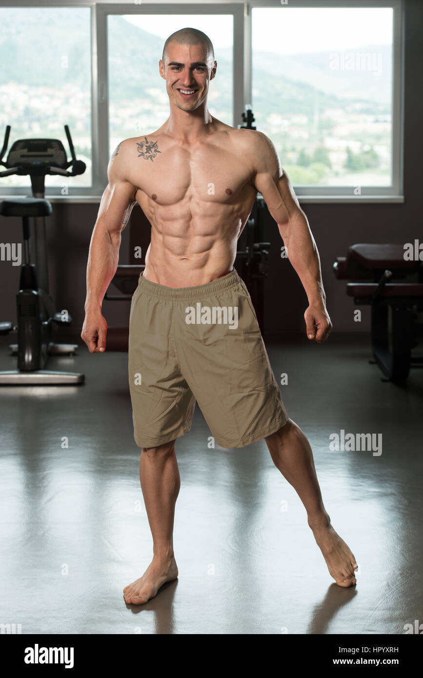 Portrait Of A Young Physically Fit Man Showing His Well Trained Body ...