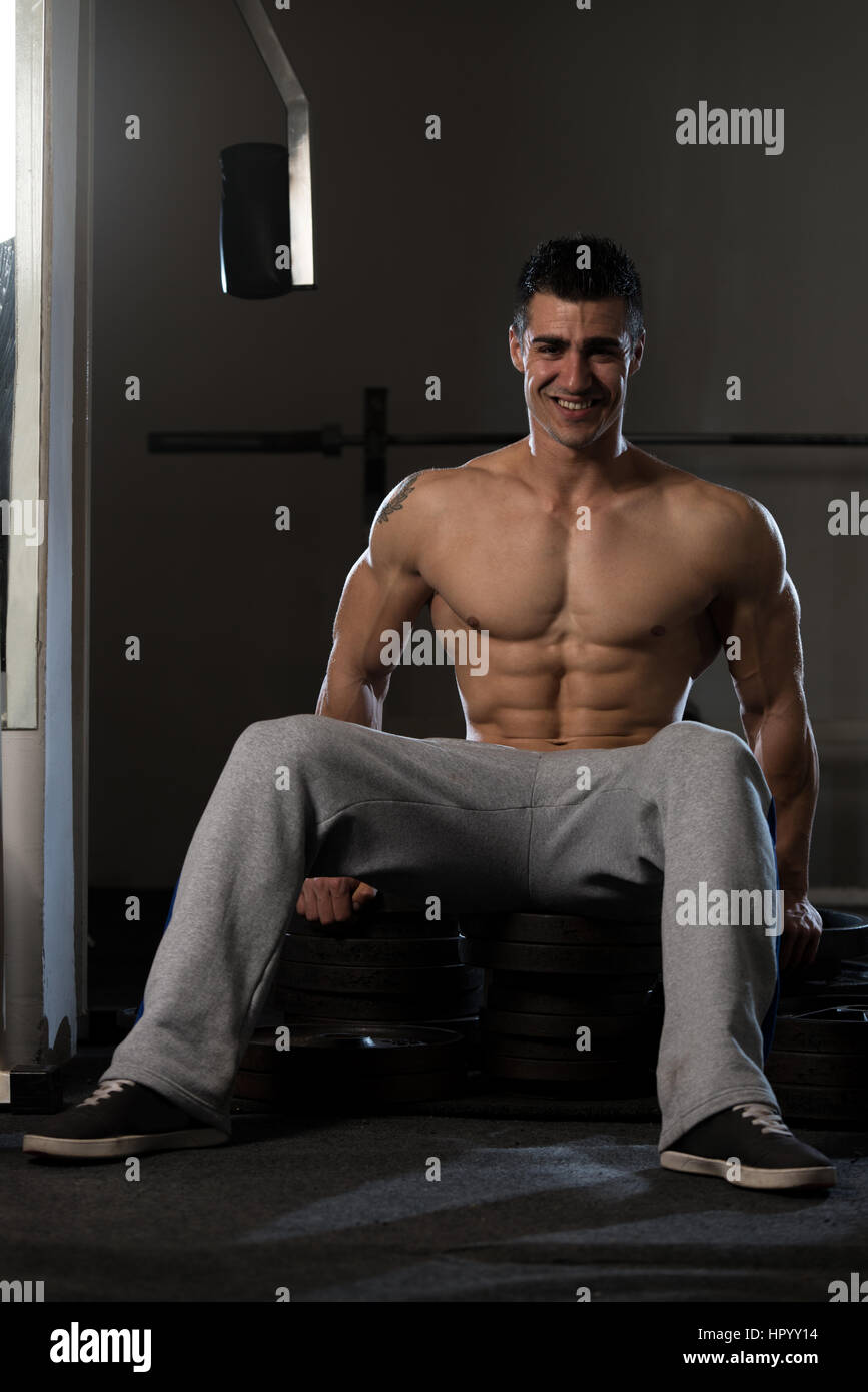 Muscular Man Resting After Exercises - Portrait Of A Physically Fit ...