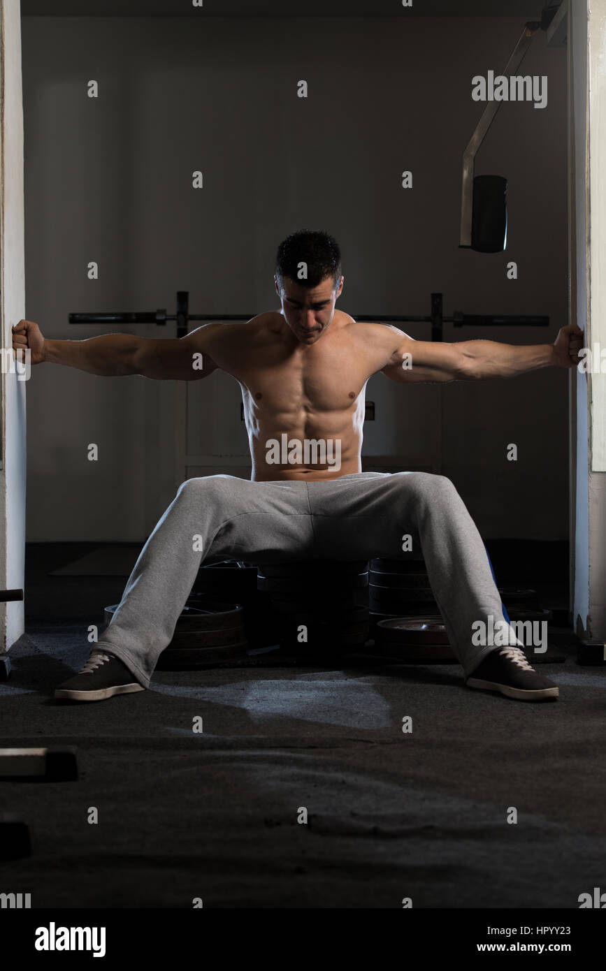 Portrait Of A Young Physically Fit Man Showing His Well Trained Body ...