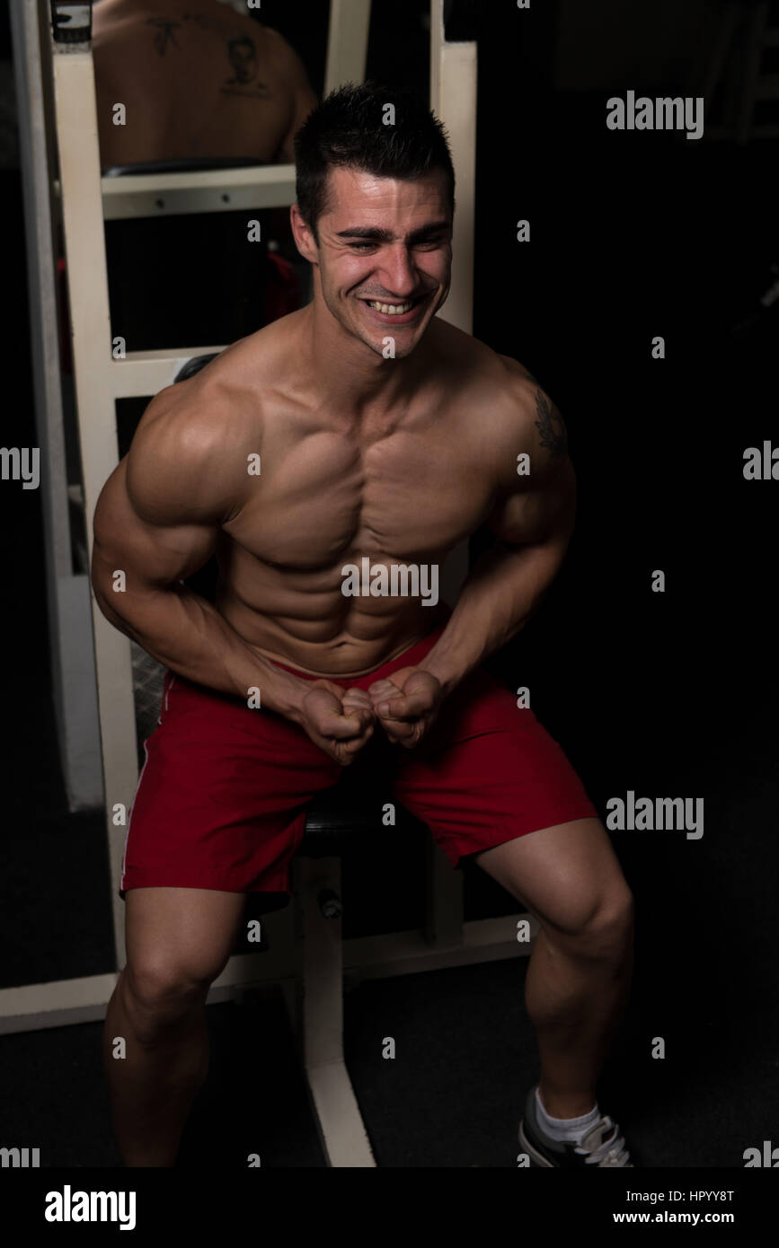 Portrait Of A Young Physically Fit Man Showing His Well Trained Body ...