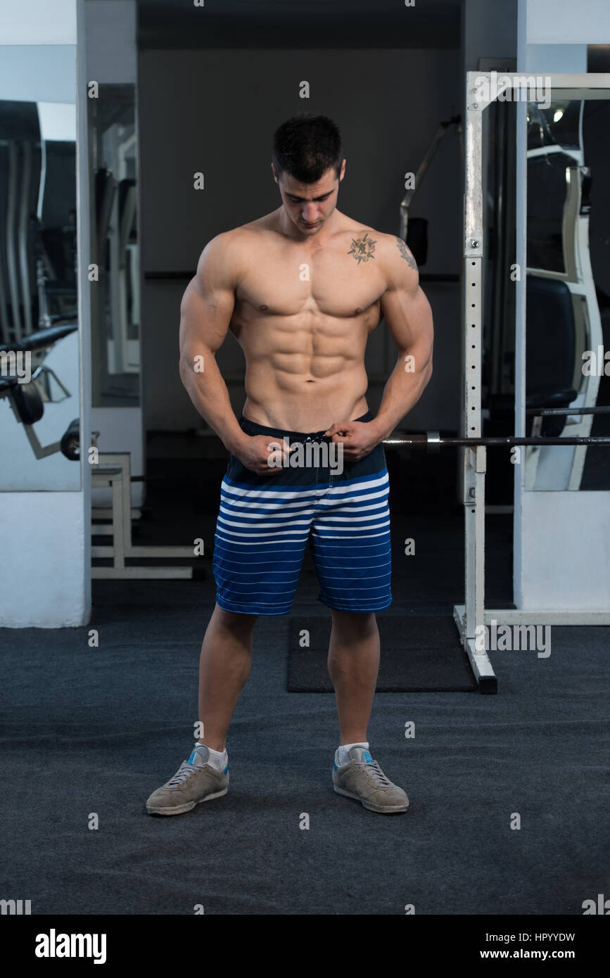 Portrait Of A Young Physically Fit Man Showing His Well Trained Body ...