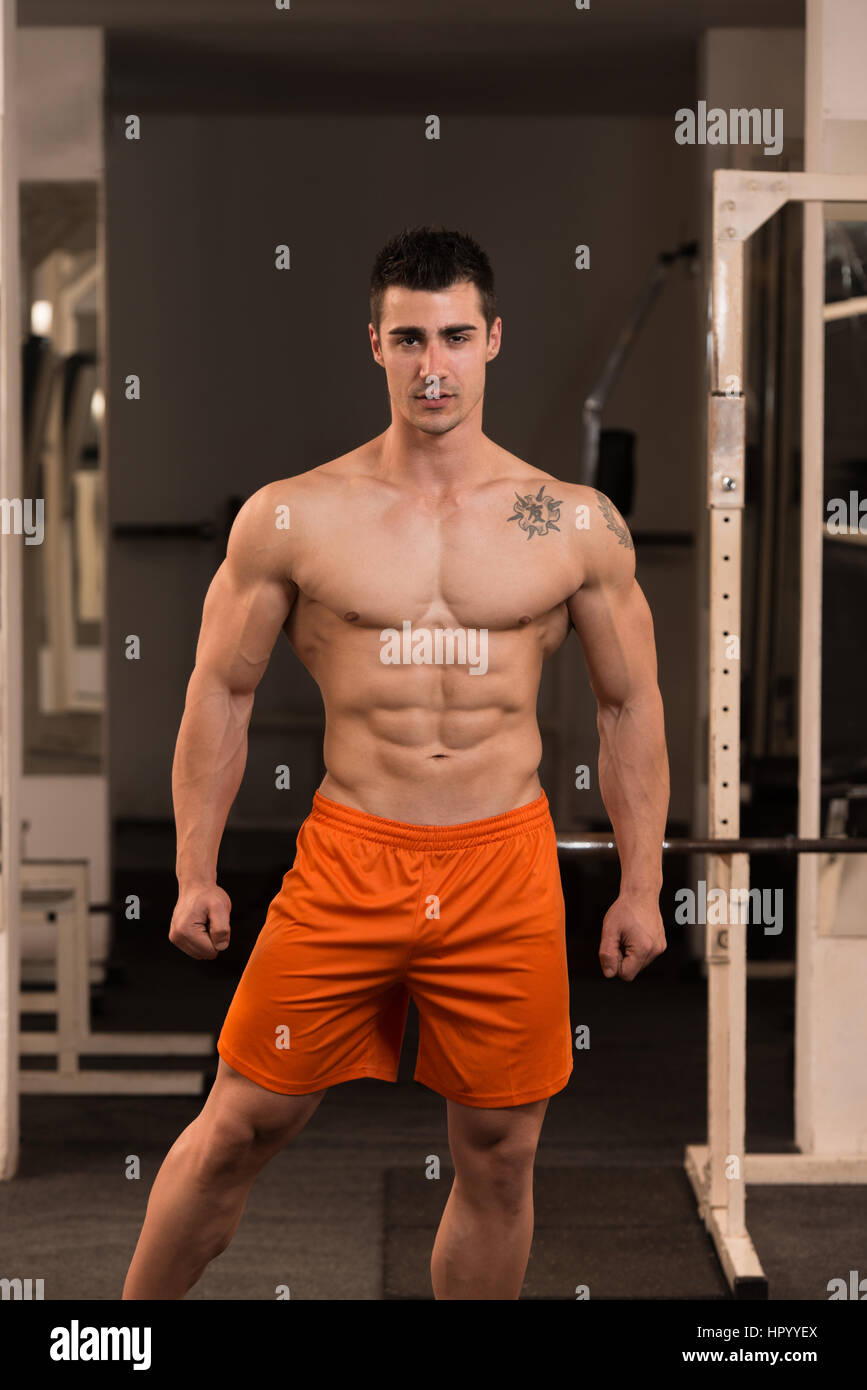 Bodybuilder Posing In Different Poses Demonstrating Their Muscles ...