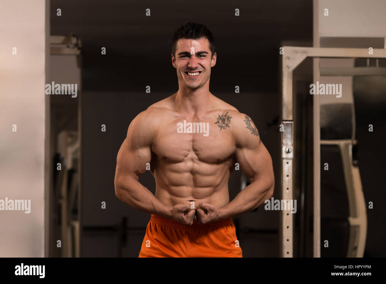 Bodybuilder Posing In Different Poses Demonstrating Their Muscles ...