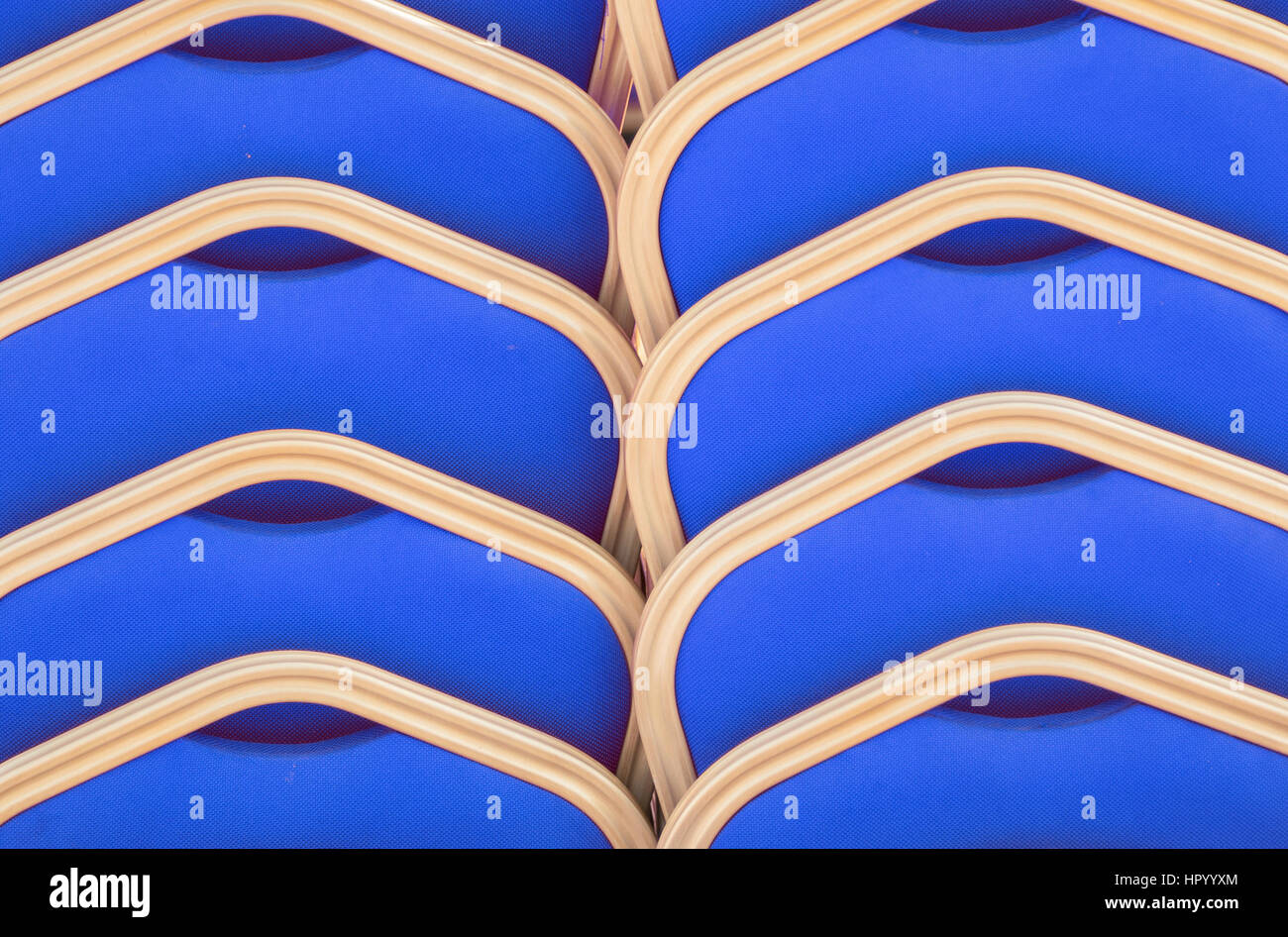 close-up of blue chairs back Stock Photo - Alamy