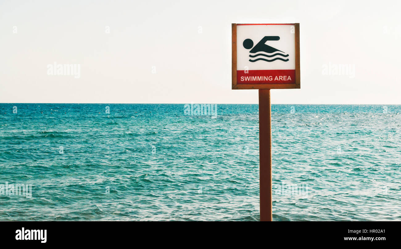 sign can float on the sea beach Stock Photo - Alamy