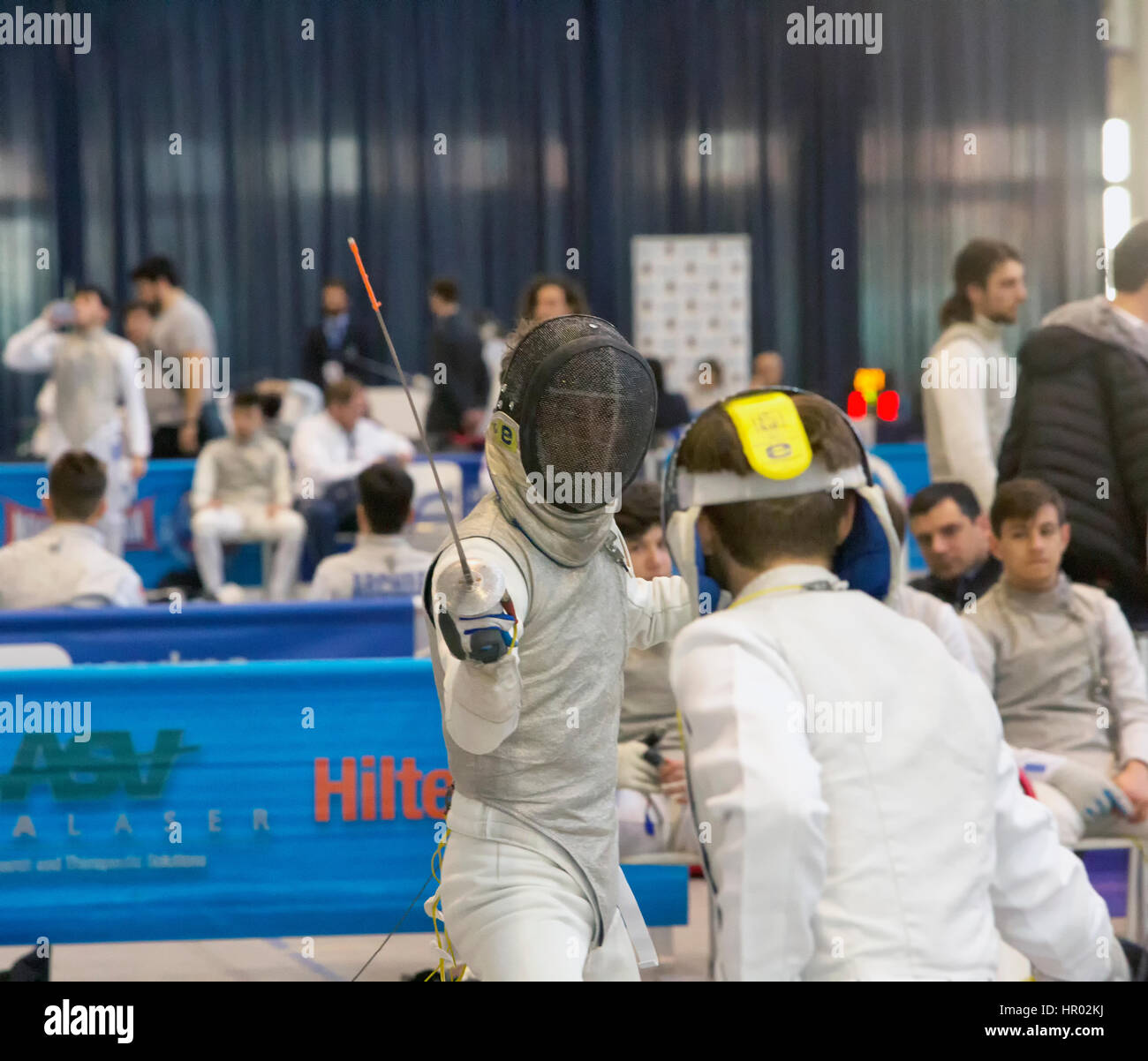CASALE MONFERRATO, ITALY - FEBRUARY 25, 2017: Fencers in a match at ...