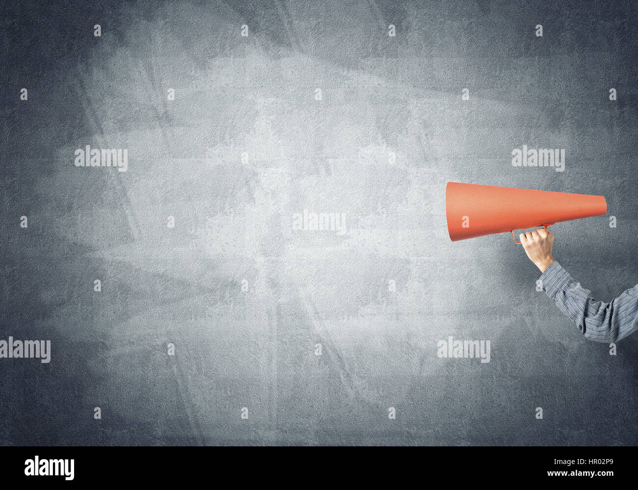 Close of man making announcement in paper trumpet Stock Photo - Alamy