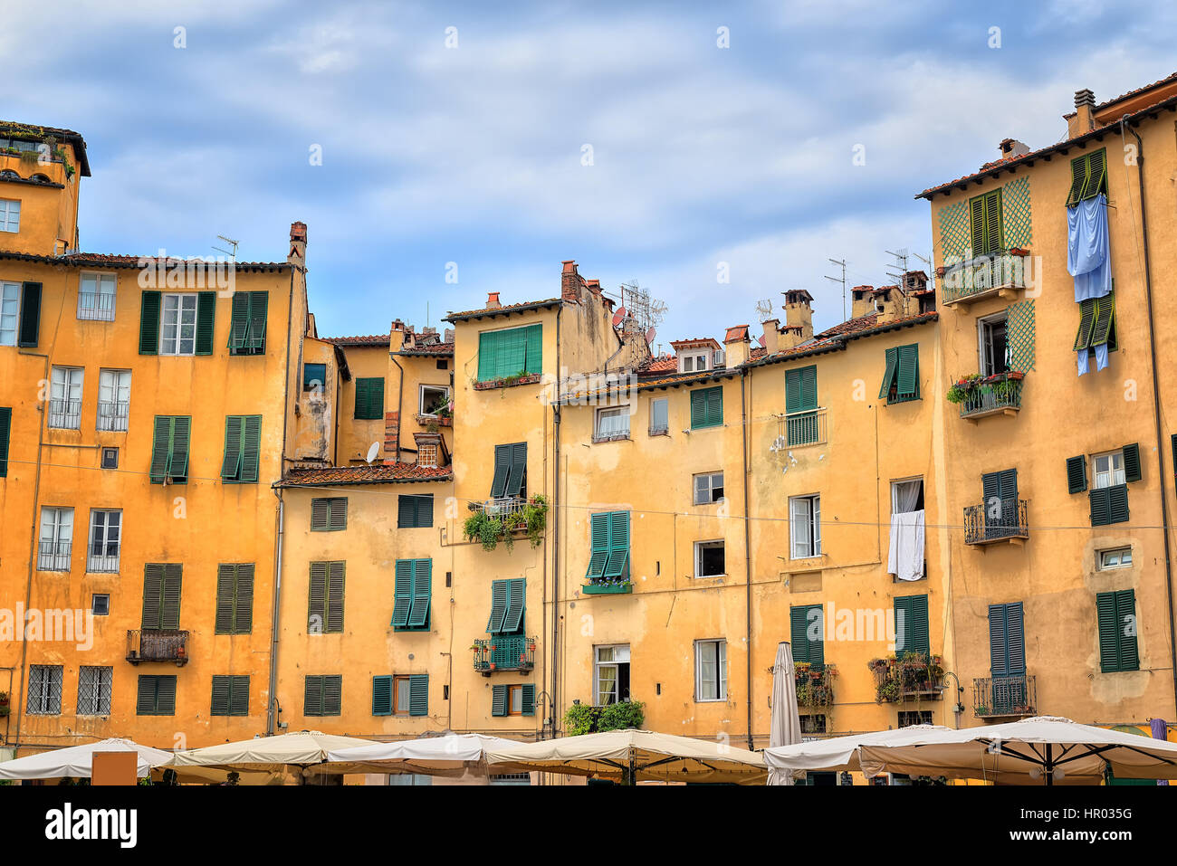 historic buildings at the Piazza del Anfiteatro in Lucca, Italy Stock ...