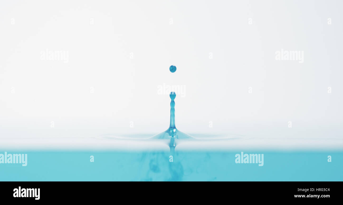 side view of bright blue water drop with accurate splash, 4k photo ...