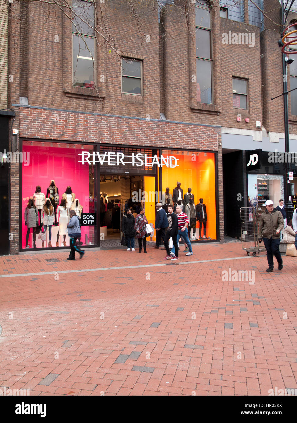 River Island ladies and men clothing retailer sign over shop, company ...
