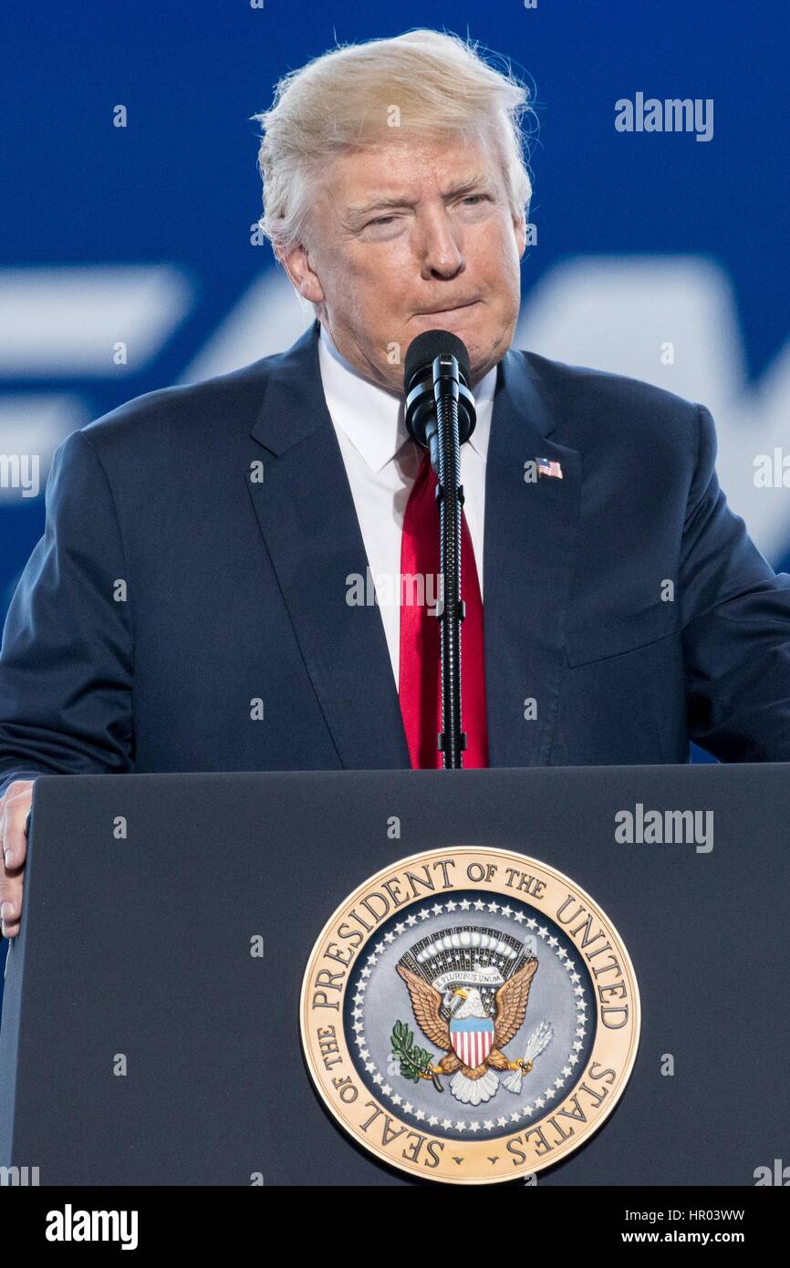 U.S. President Donald Trump addresses employees at the debut of the new ...
