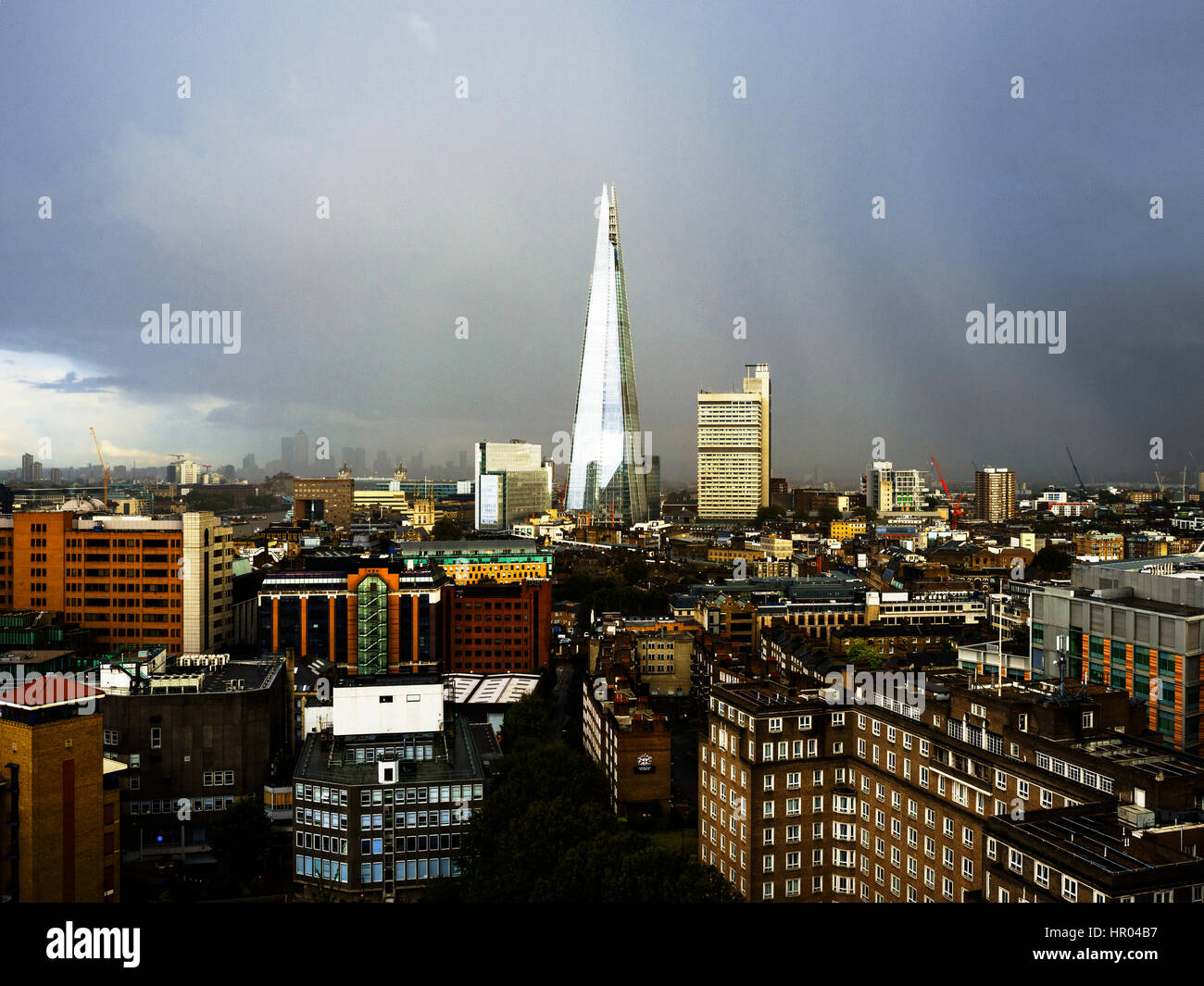 UK, London, Aerial view over South London and the Shard with Canary ...