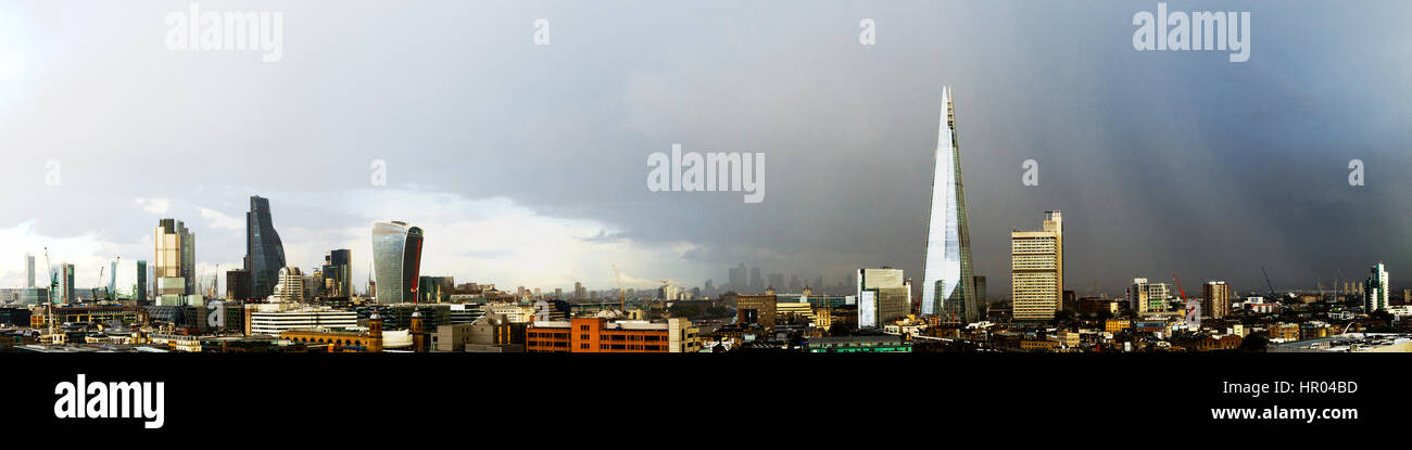 The Shard and the business district, panoramic view with dramatic sky ...