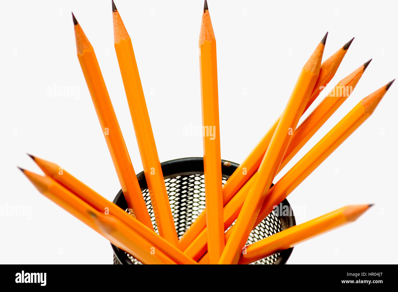 set of yellow pencils in a pen holder Stock Photo - Alamy