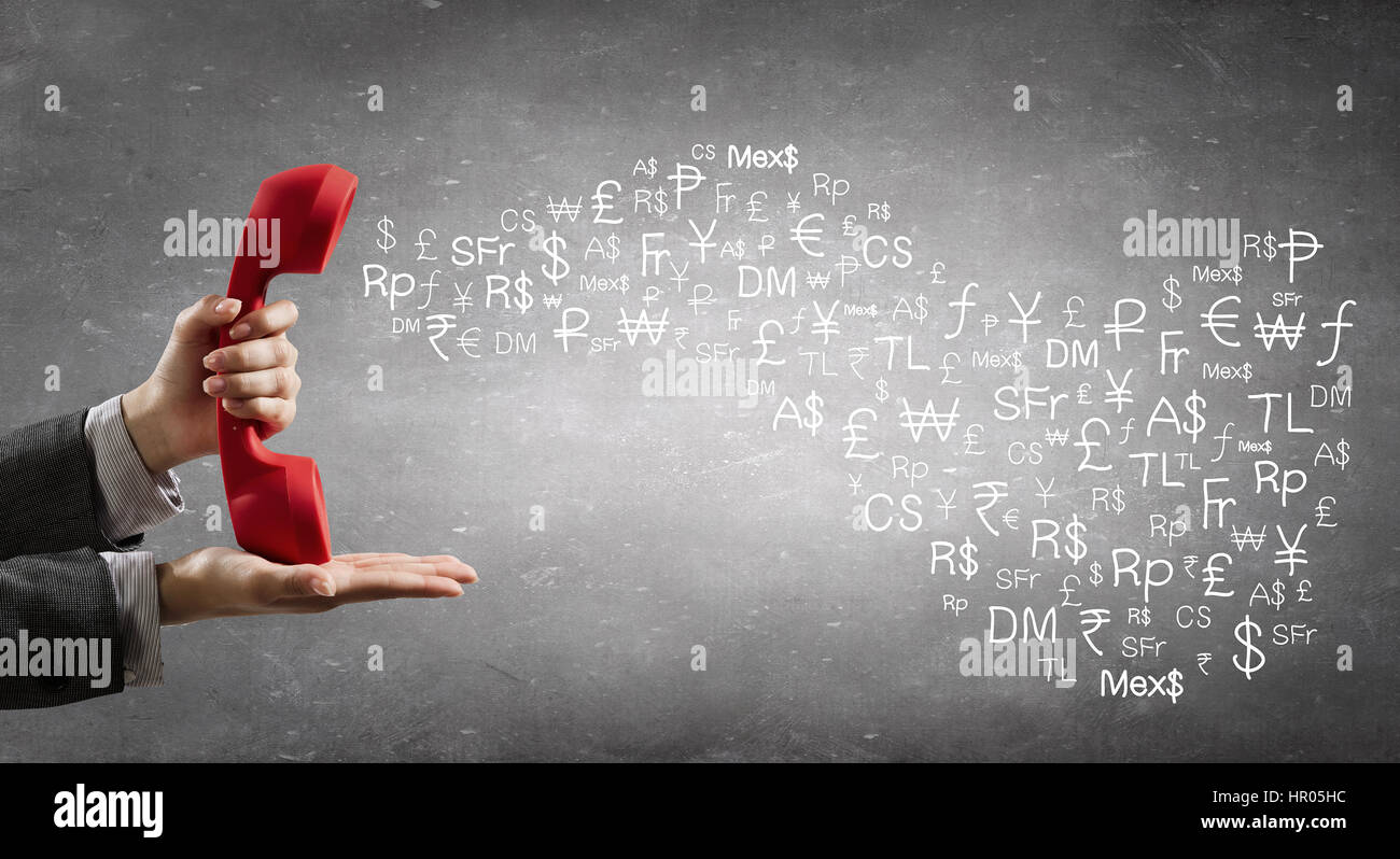 Female hand holding the receiver of an old telephone hi-res stock ...