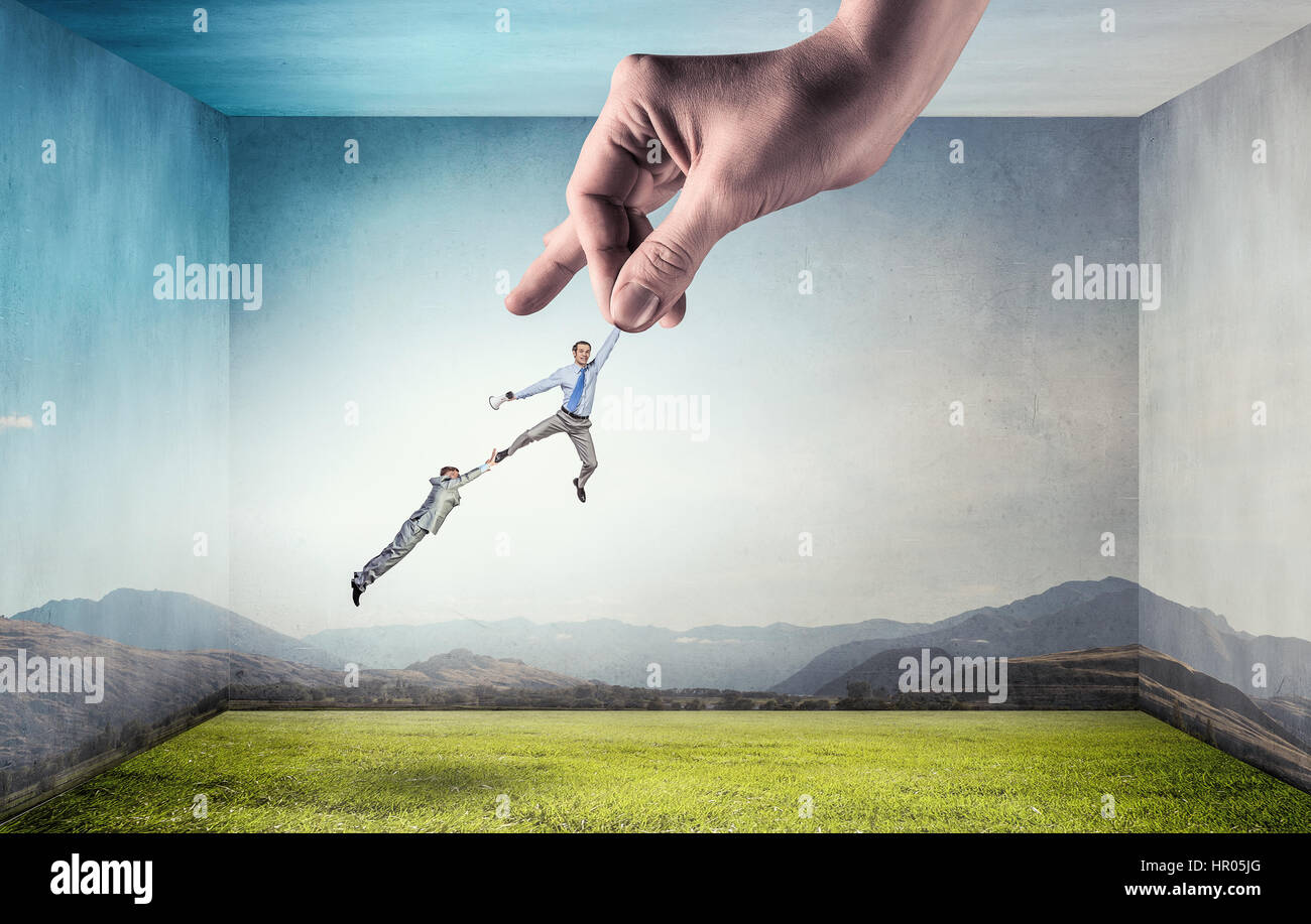 Hand of power and control . Mixed media Stock Photo - Alamy