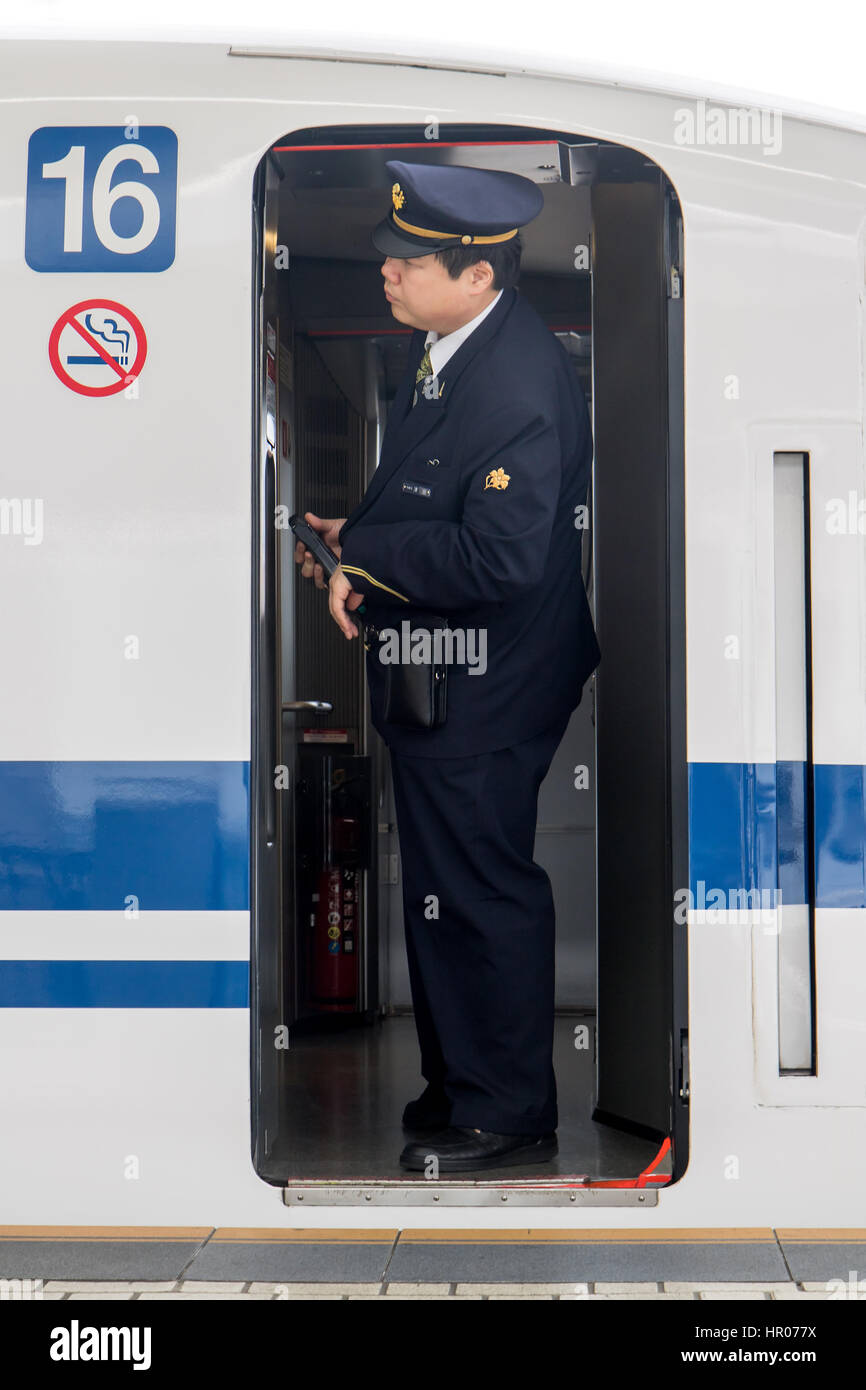 Japanese train guard hi-res stock photography and images - Alamy