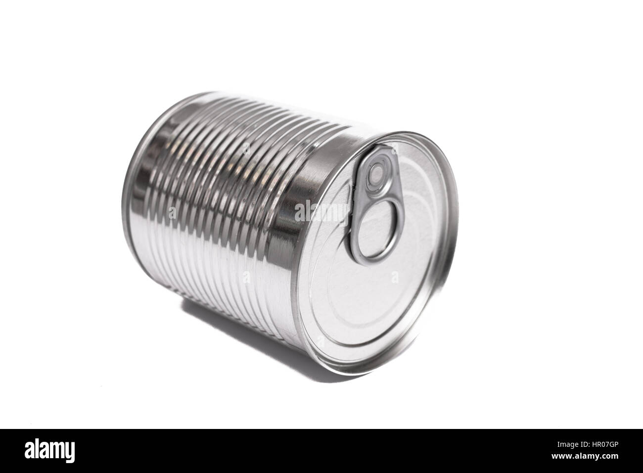 White isolated lying tin with lid Stock Photo - Alamy