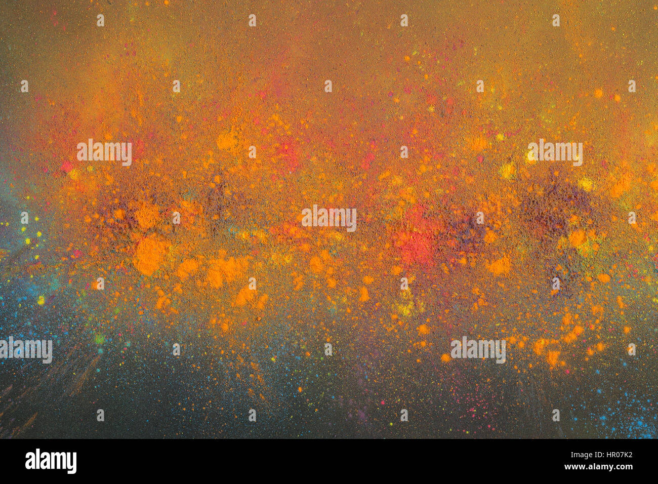 Holi colours on black background Stock Photo - Alamy