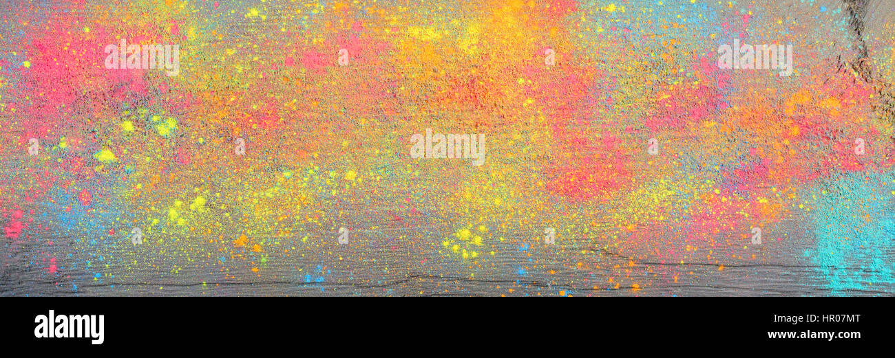 Holi colours on wood Stock Photo - Alamy