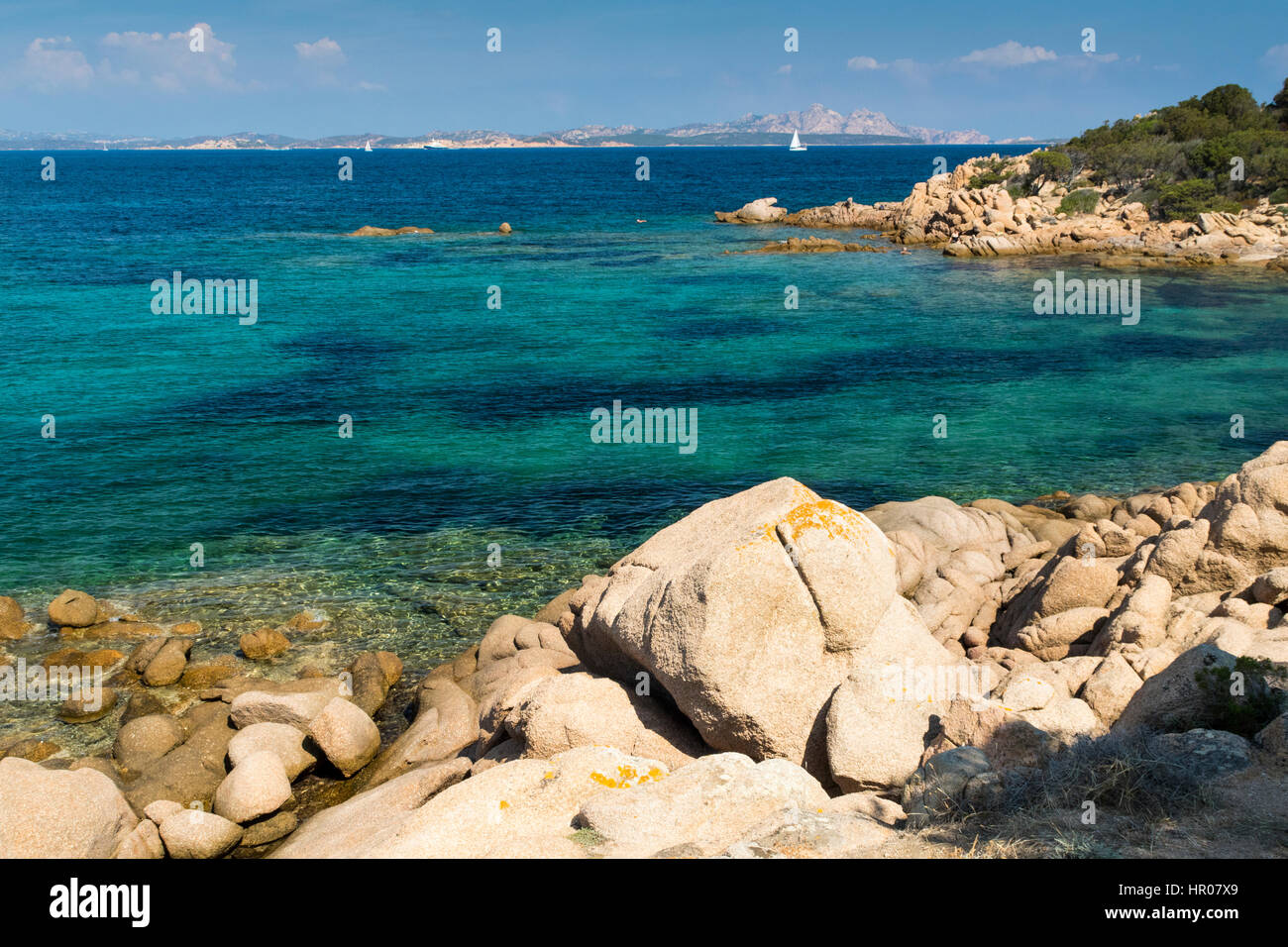 Colourful Granite Coastline & Isola Caprera With Blue Sky – Baia ...