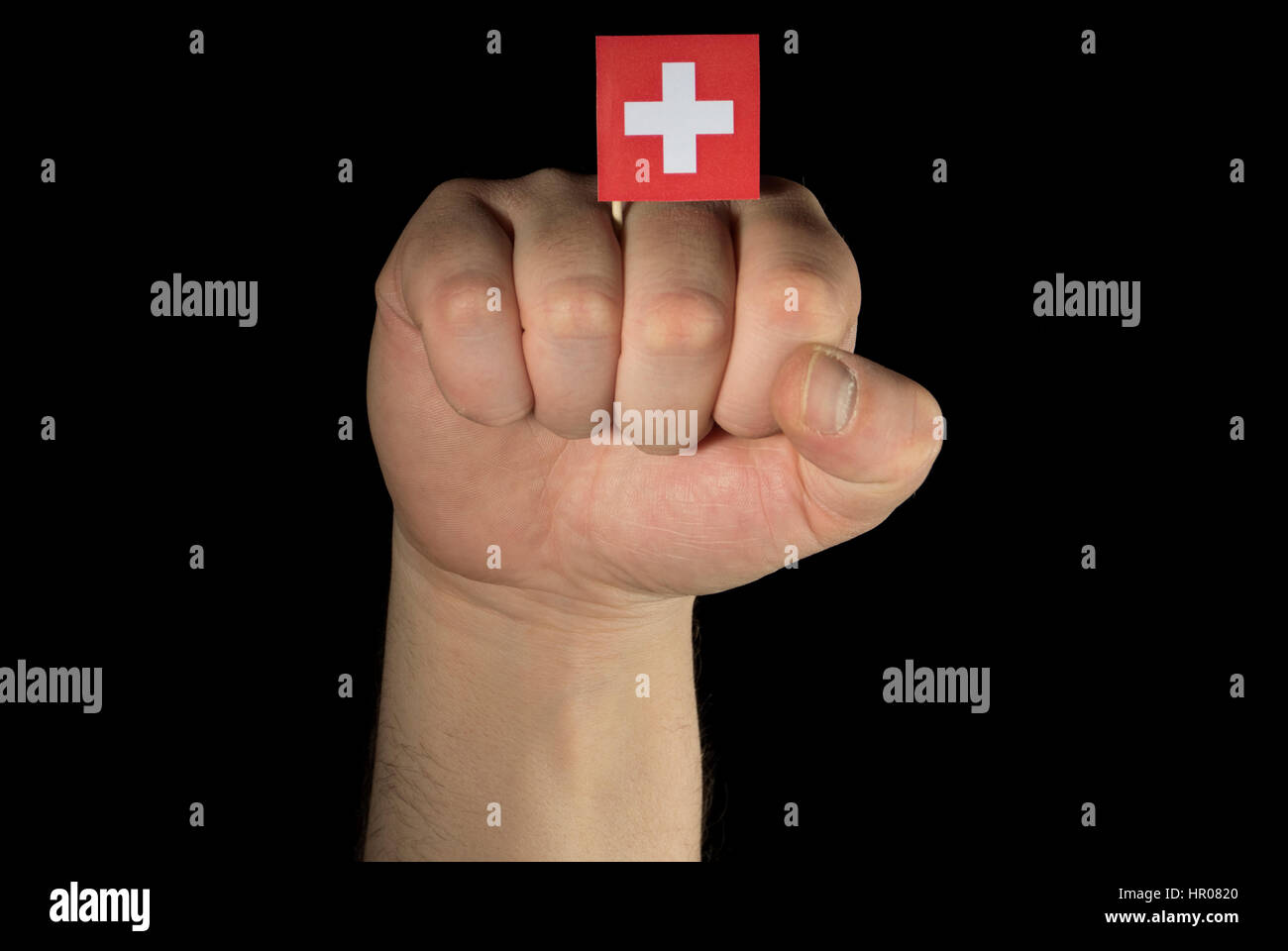 Man hand fist with Swiss flag isolated on black background Stock Photo ...