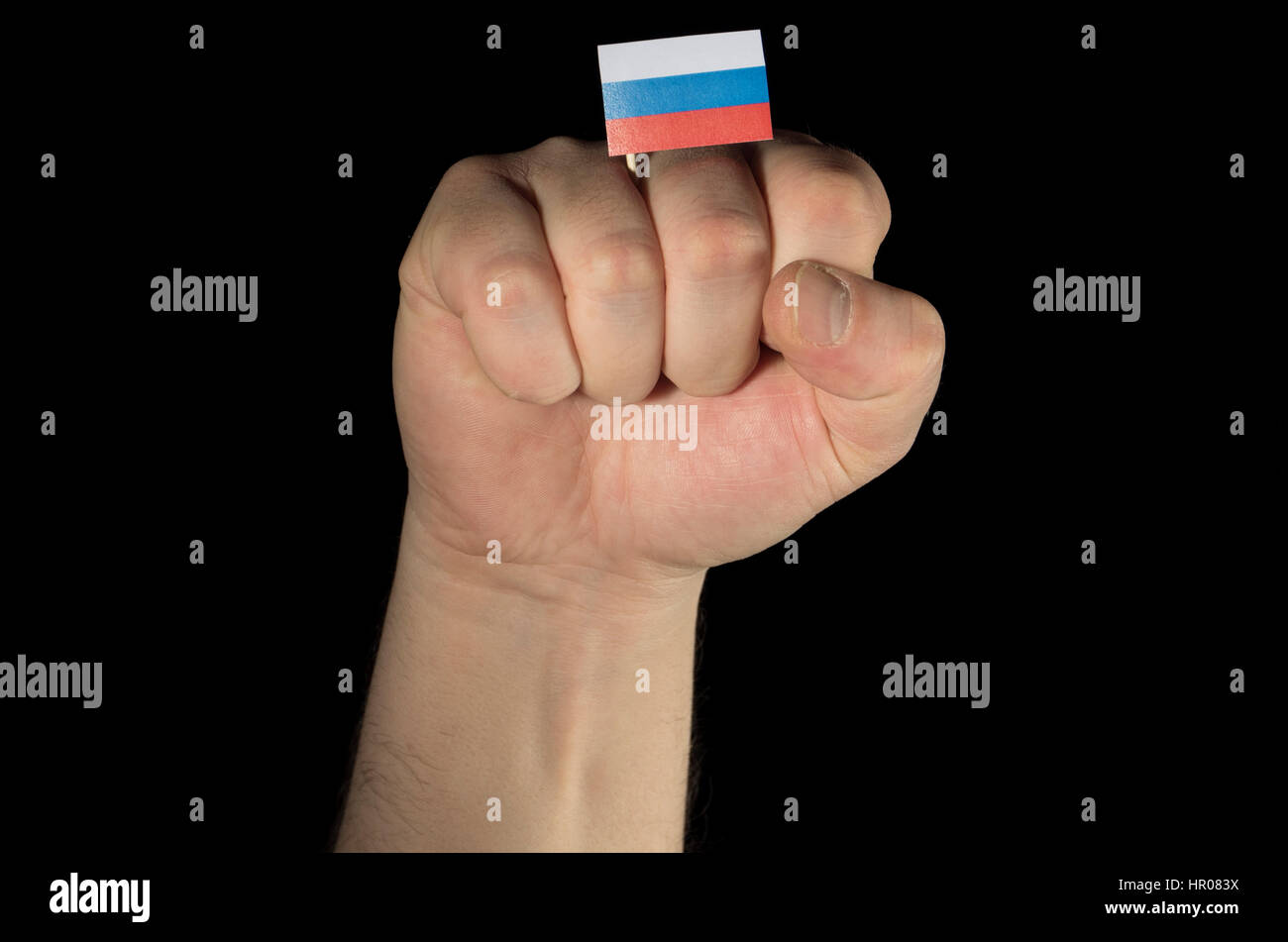 Man hand fist with Russian flag isolated on black background Stock ...