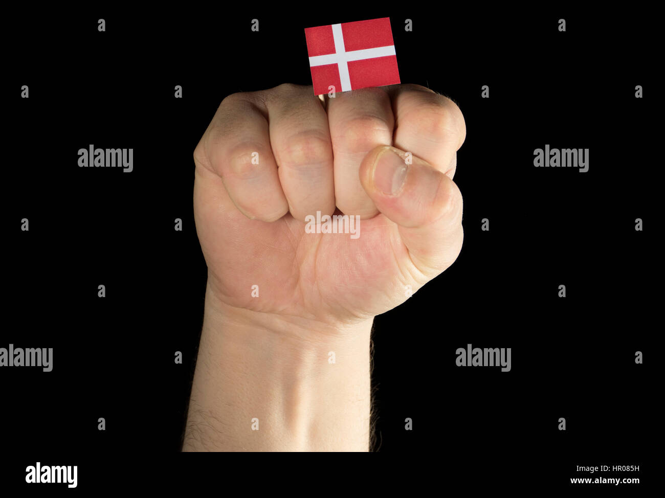 Man hand fist with Danish flag isolated on black background Stock Photo ...