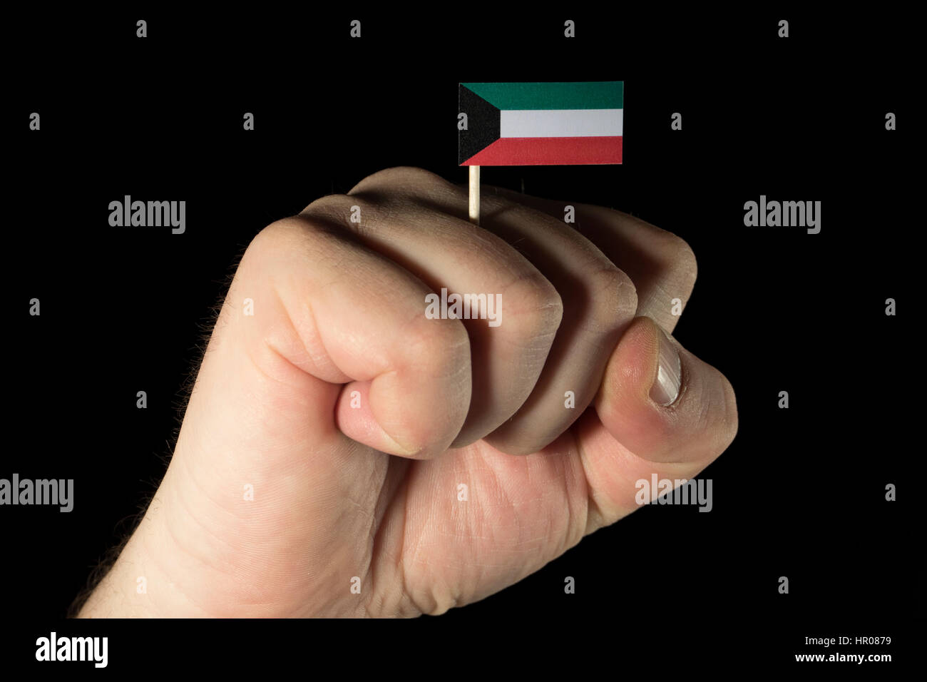 Man hand fist with Kuwaiti flag isolated on black background Stock ...