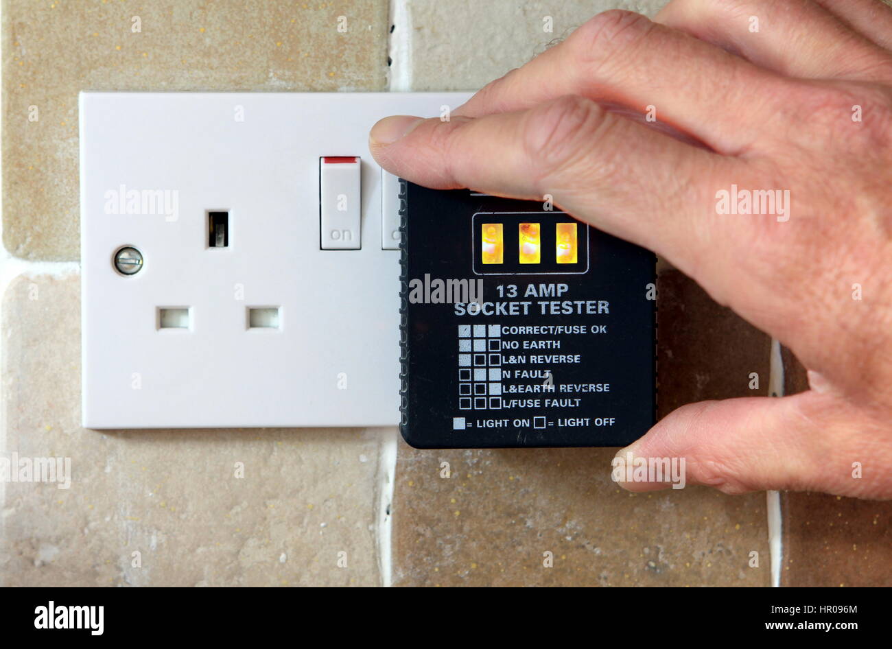 UK 13 AMP Socket tester showing socket working correctly Stock Photo ... UK 13 AMP Socket tester showing socket working correctly Stock Photo ...