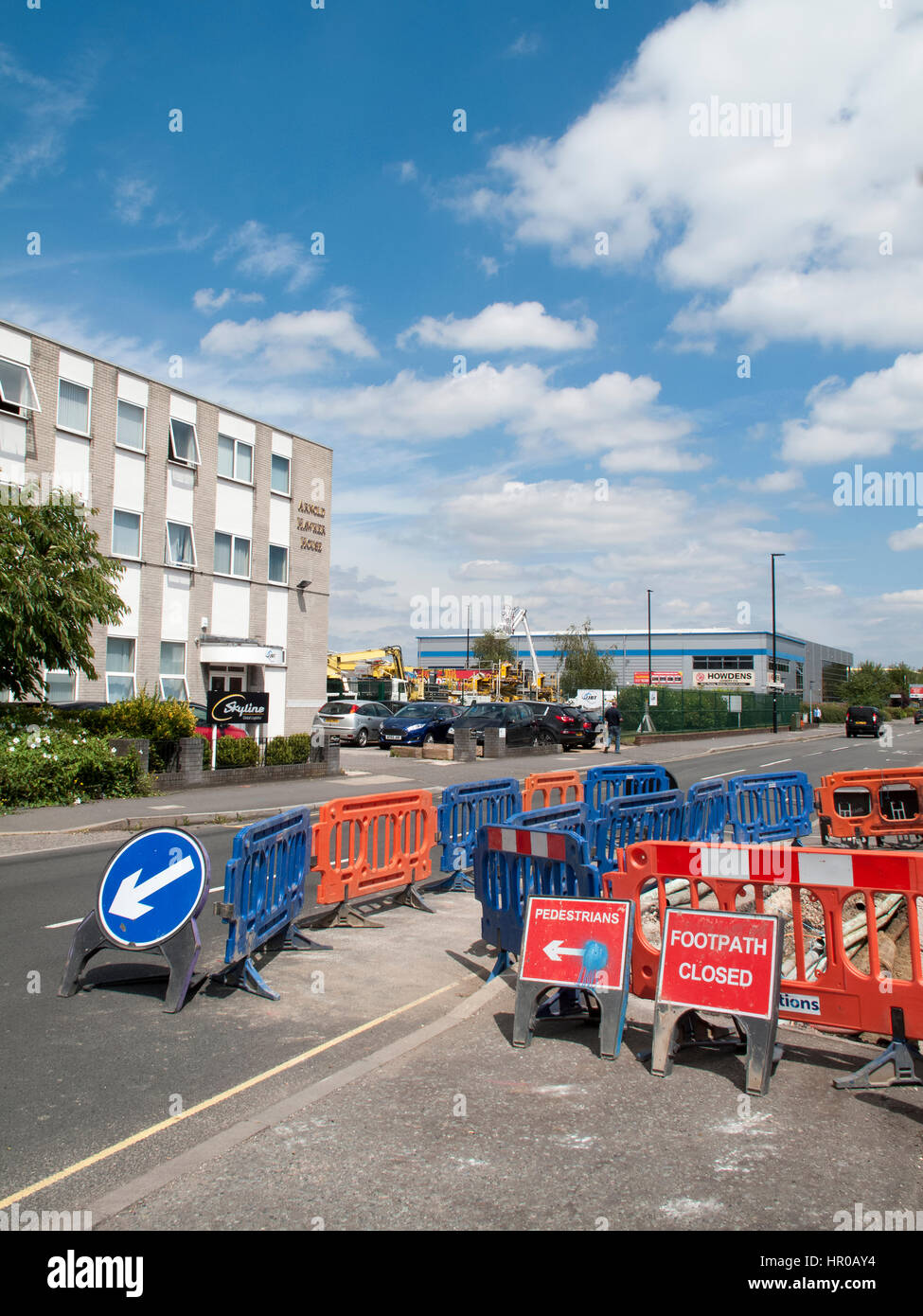 Road works with safety barriers blocking pedestrian footpath Stock ...
