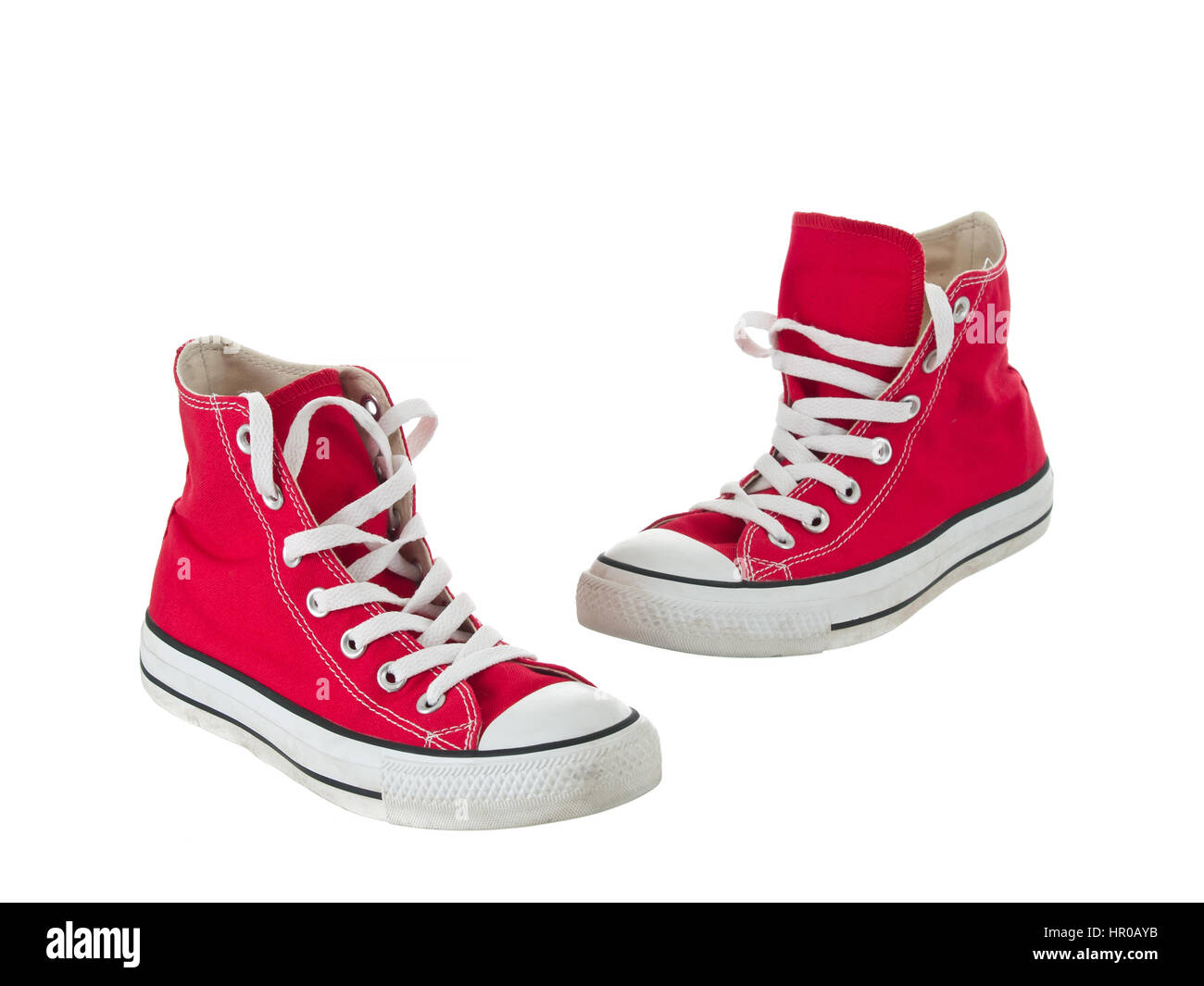 Vintage hanging red shoes on pure white background Stock Photo - Alamy