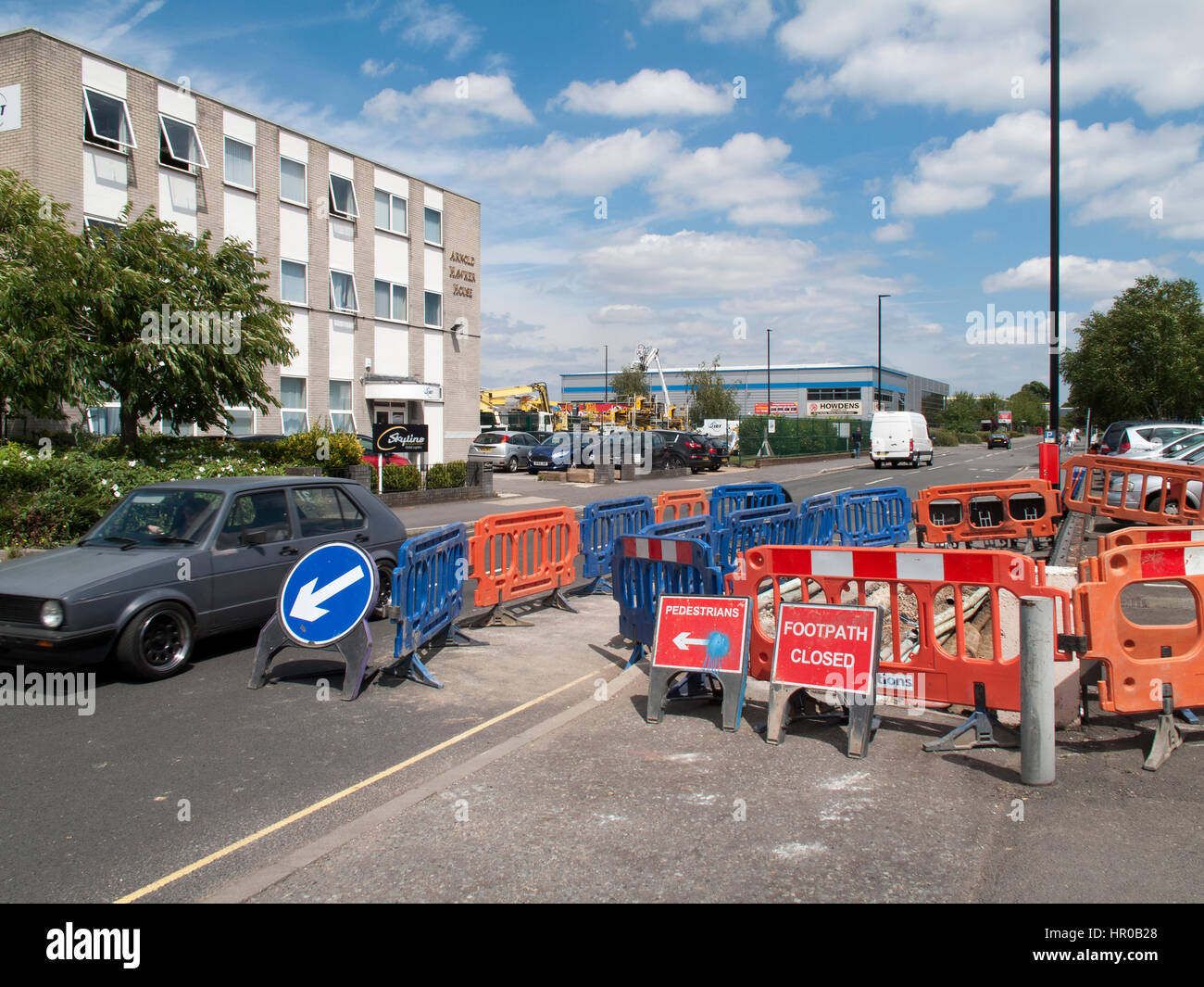 Road works with safety barriers blocking pedestrian footpath Stock ...