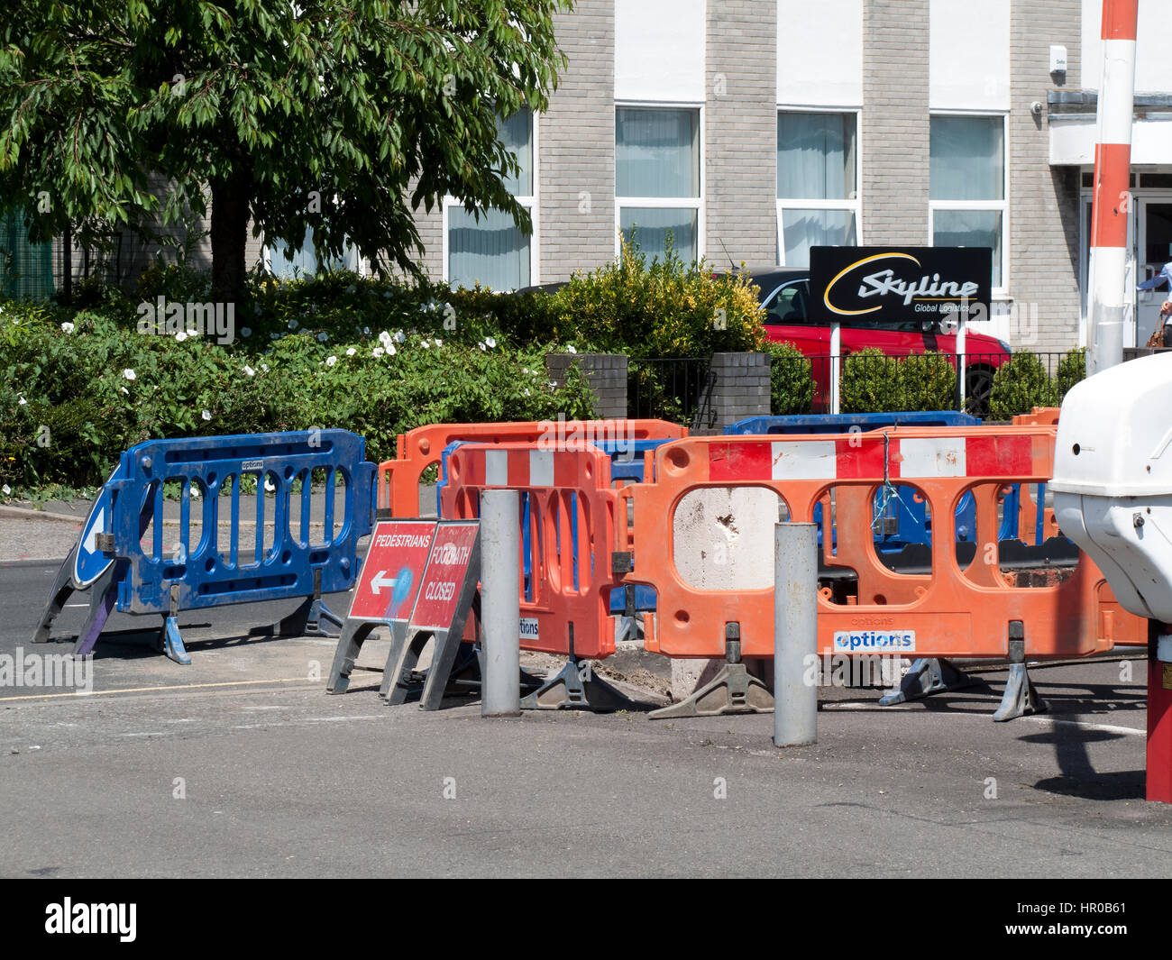 Road works with safety barriers blocking pedestrian footpath Stock ...
