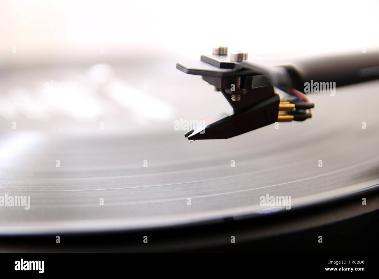 Cartridge of a modern high quality turntable record player about to be ...
