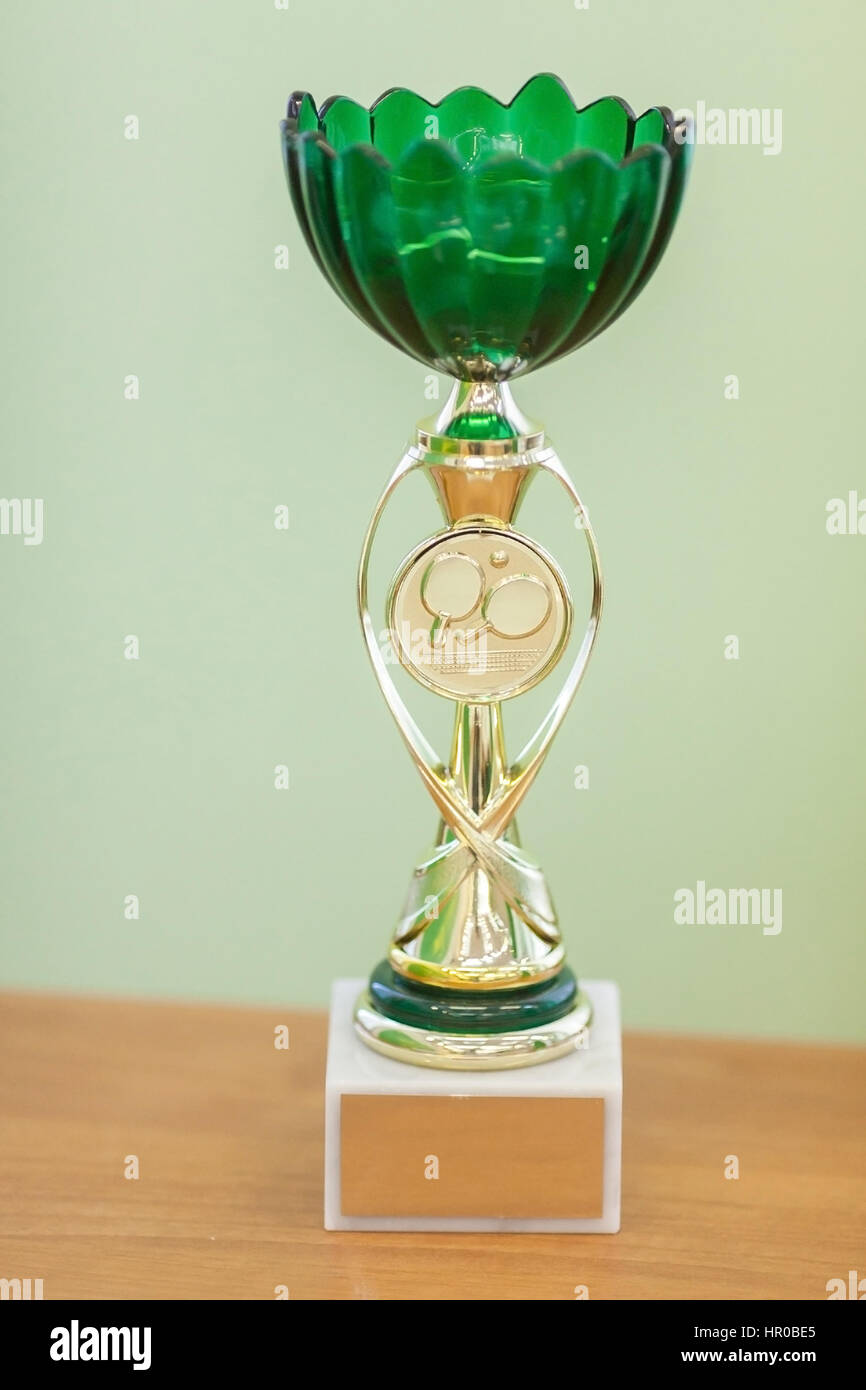 Tennis cup. Cup on table tennis Stock Photo - Alamy