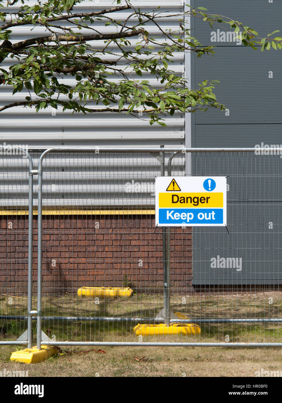 Danger keep out sign and barriers to building site refurbishing ...