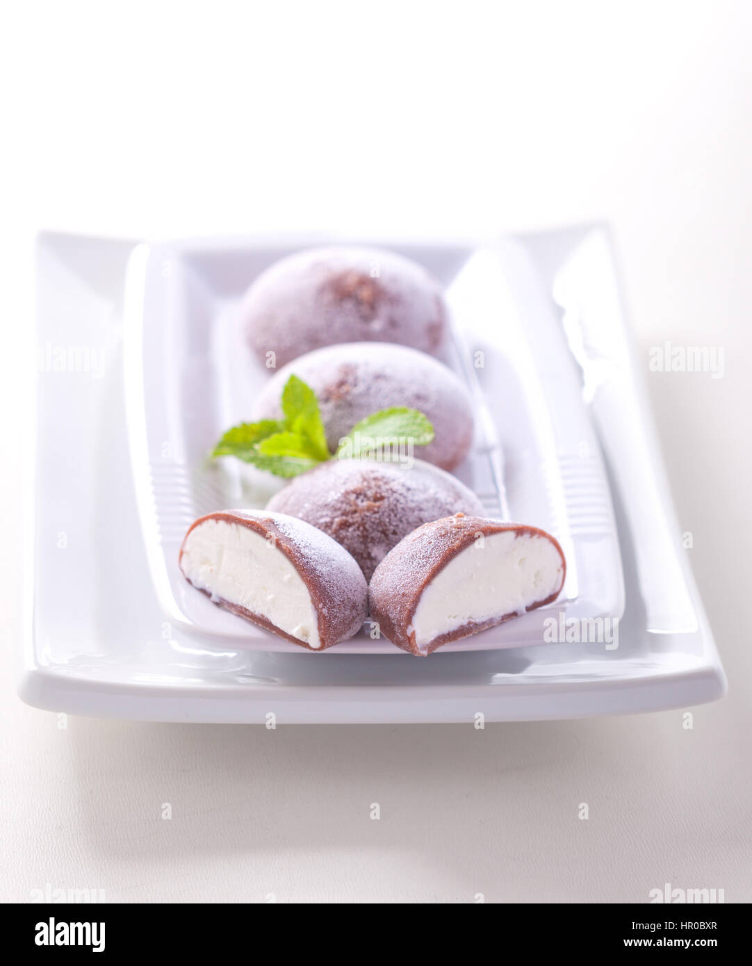 The colorful mochi dessert ice cream on wood plate Stock Photo - Alamy