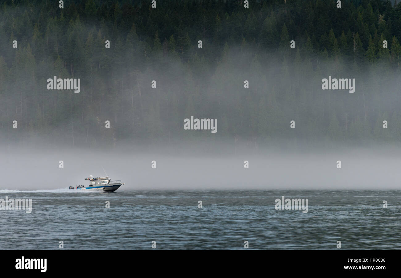Boat in Mist, Vancouver Island Stock Photo - Alamy
