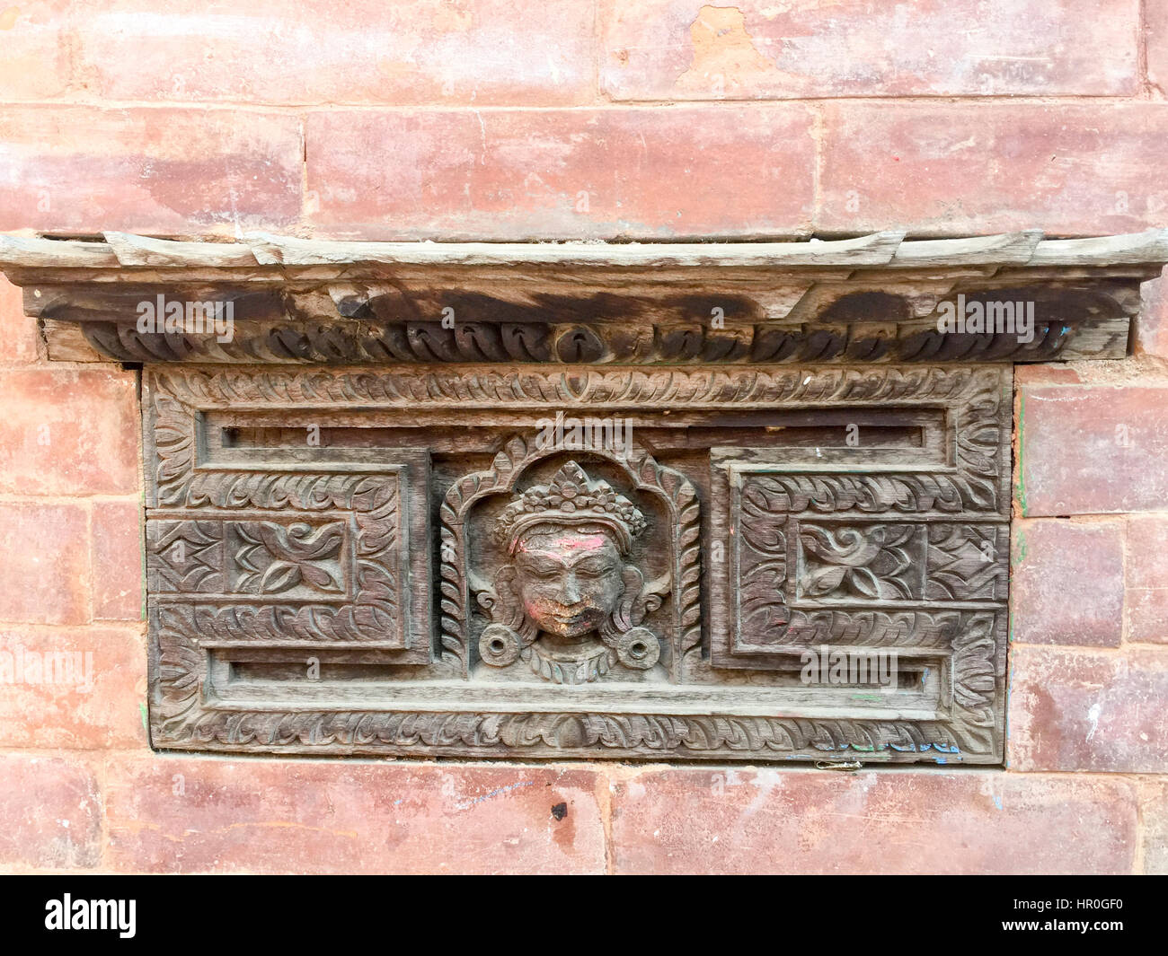 Ancient stone and woods carving with Hindus symbol for prying in ...
