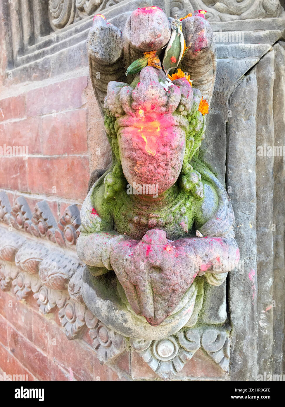 Ancient stone and woods carving with Hindus symbol for prying in ...