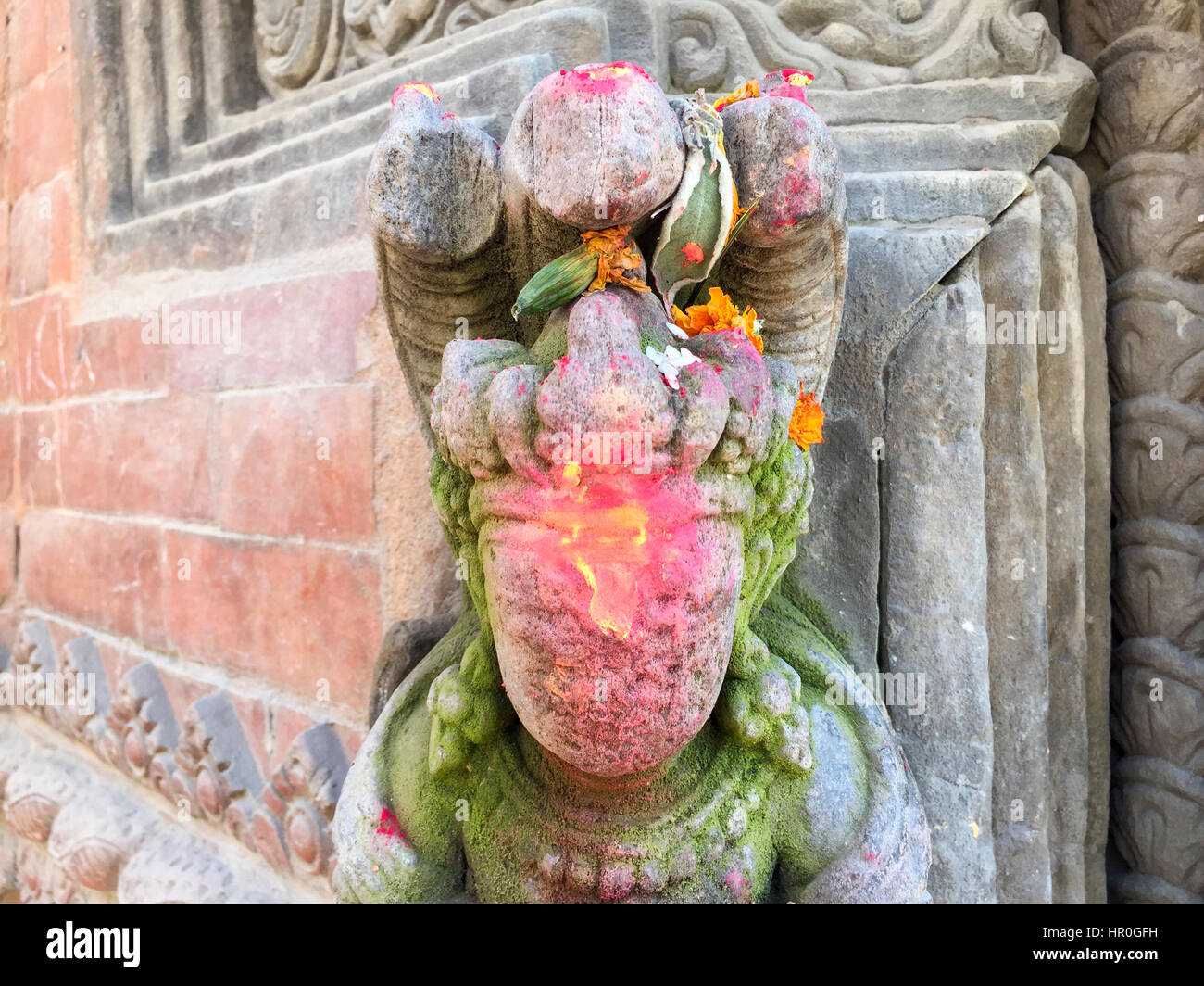 Ancient stone and woods carving with Hindus symbol for prying in ...