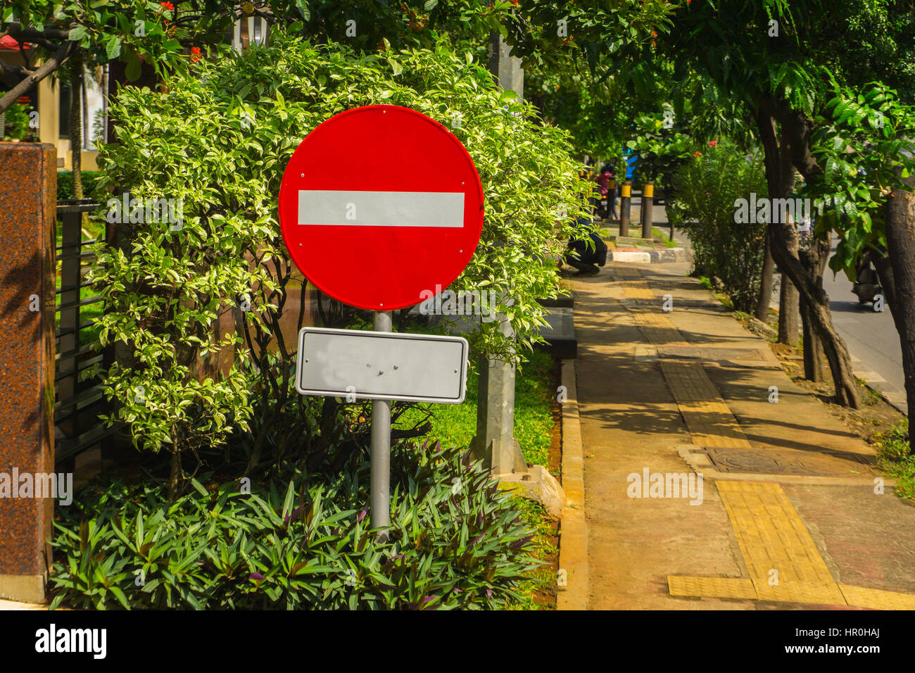 Leaf over the traffic sign hi-res stock photography and images - Alamy