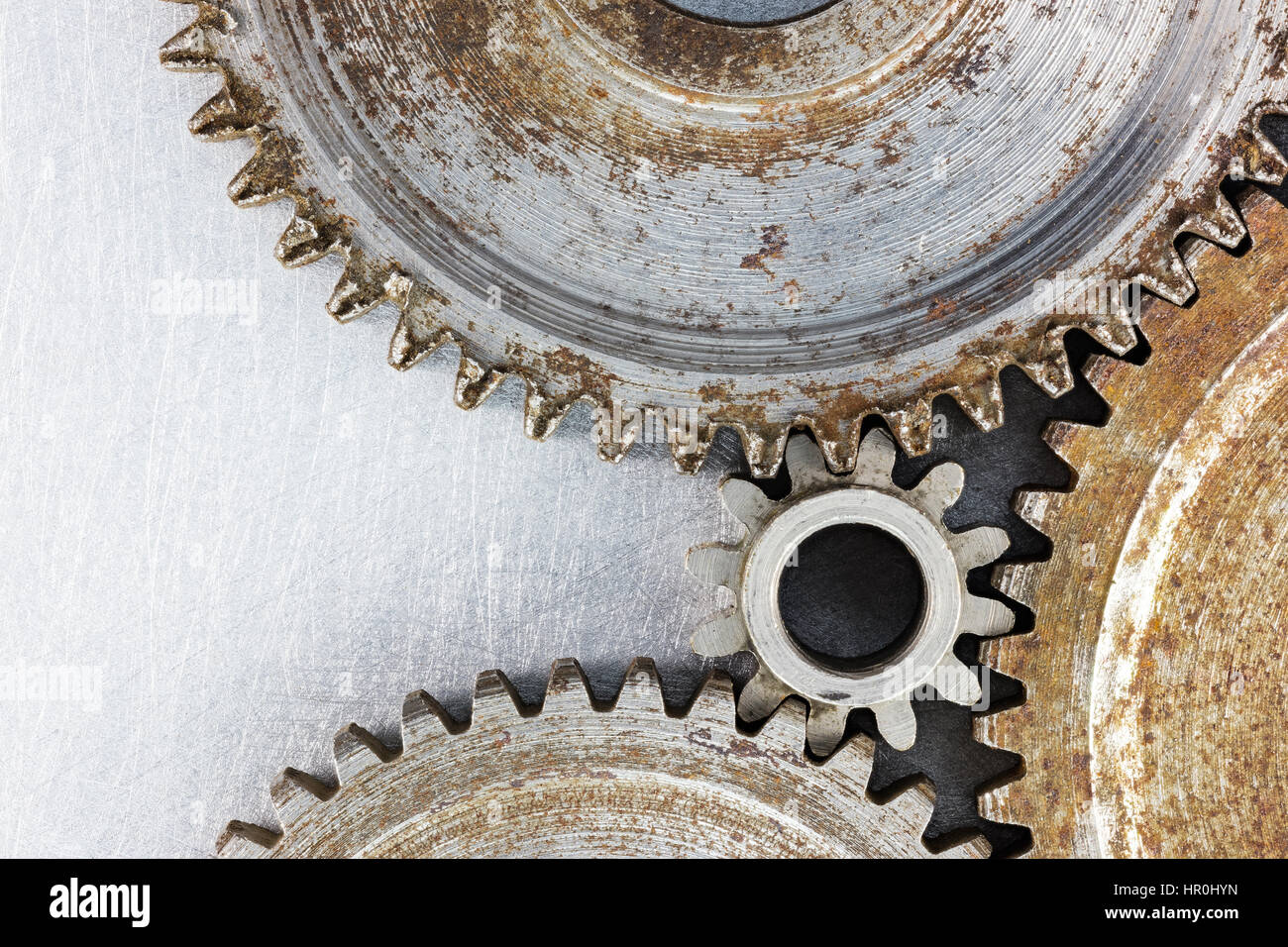 old worn out rusty cogwheels on industrial background, view from above ...