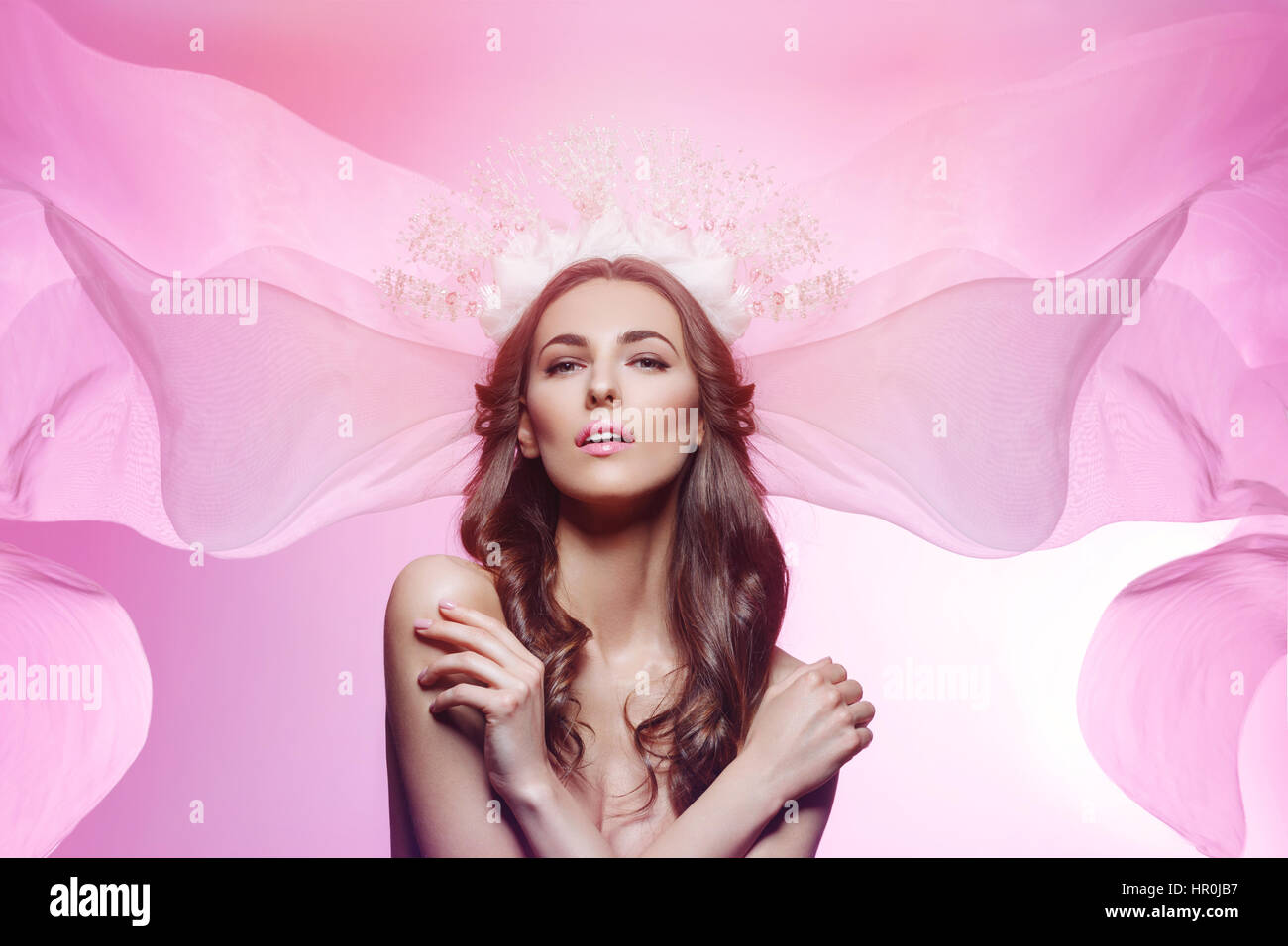 Beautiful girl in crystal crown and veil Stock Photo - Alamy