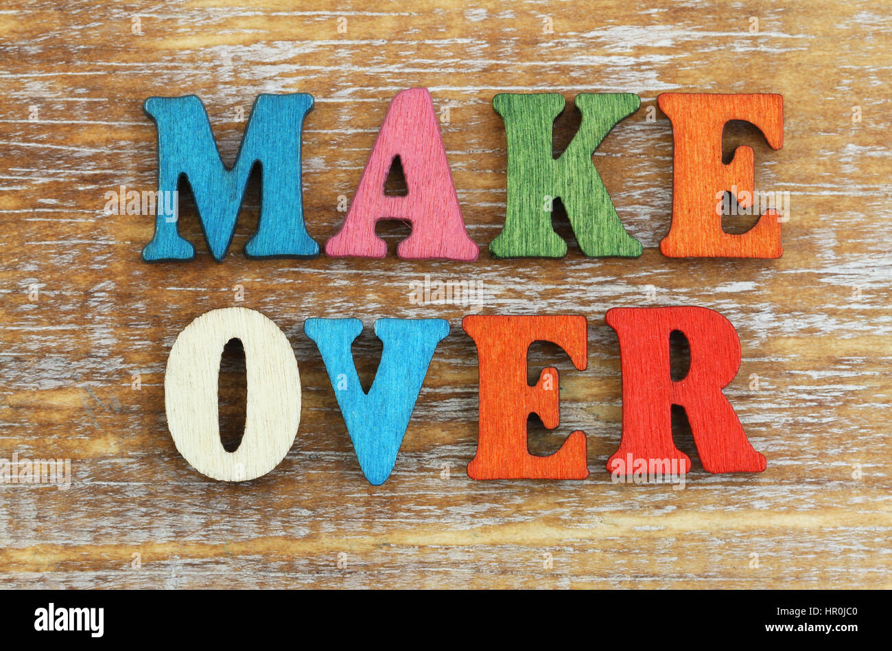Makeover written with colorful wooden letters on rustic surface Stock ...