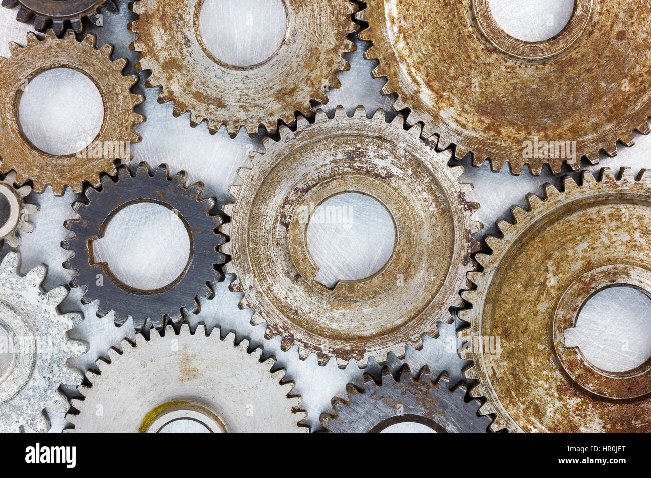 set of various metal used industrial gearwheels with rust in high ...