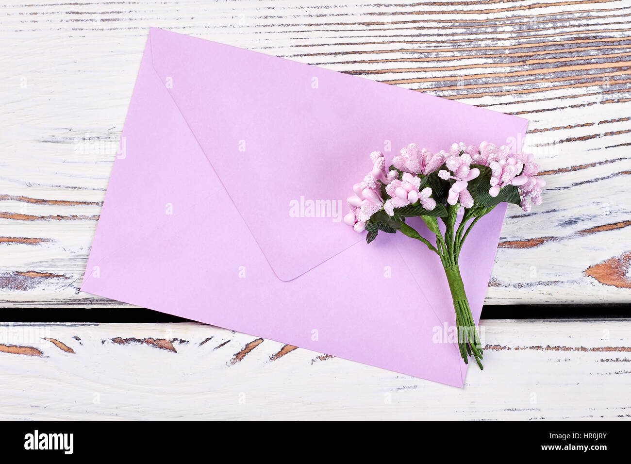 Envelope and bunch of flowers. Love confession letter Stock Photo - Alamy