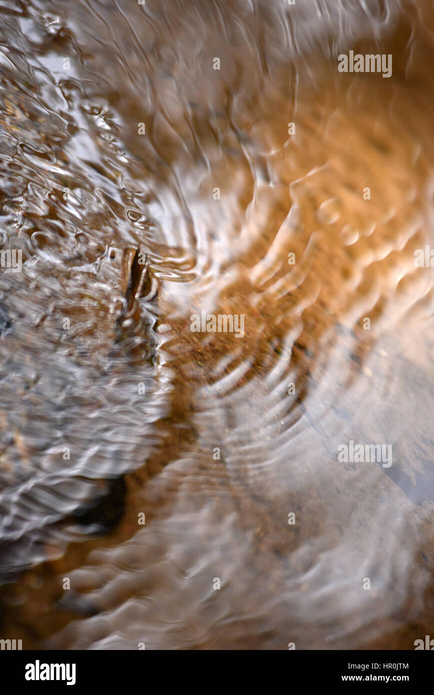 Abstract water ripples in stream water Stock Photo - Alamy